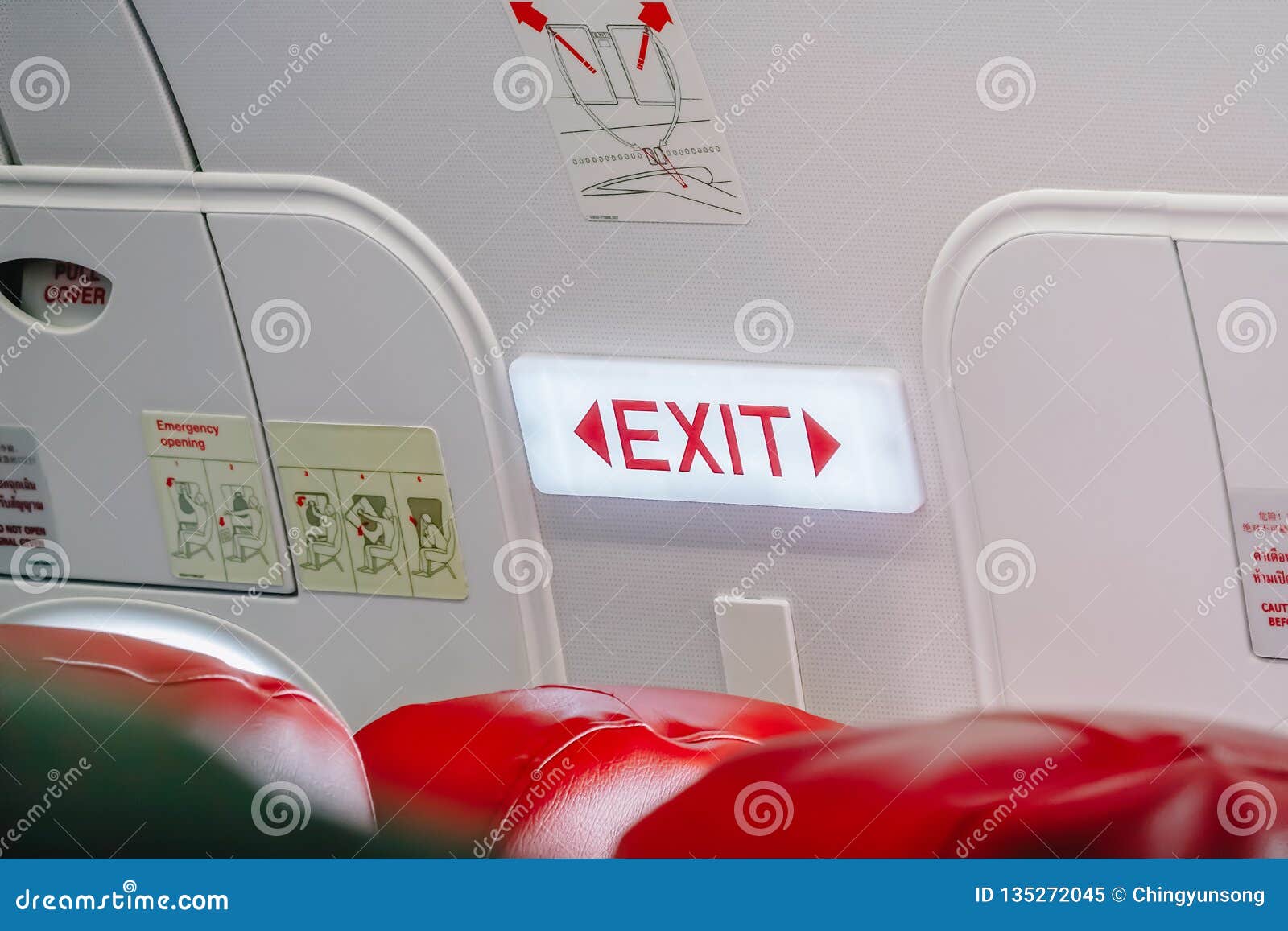 Close Up of Exit Sign , Emergency Door in Passenger Airplane Stock ...