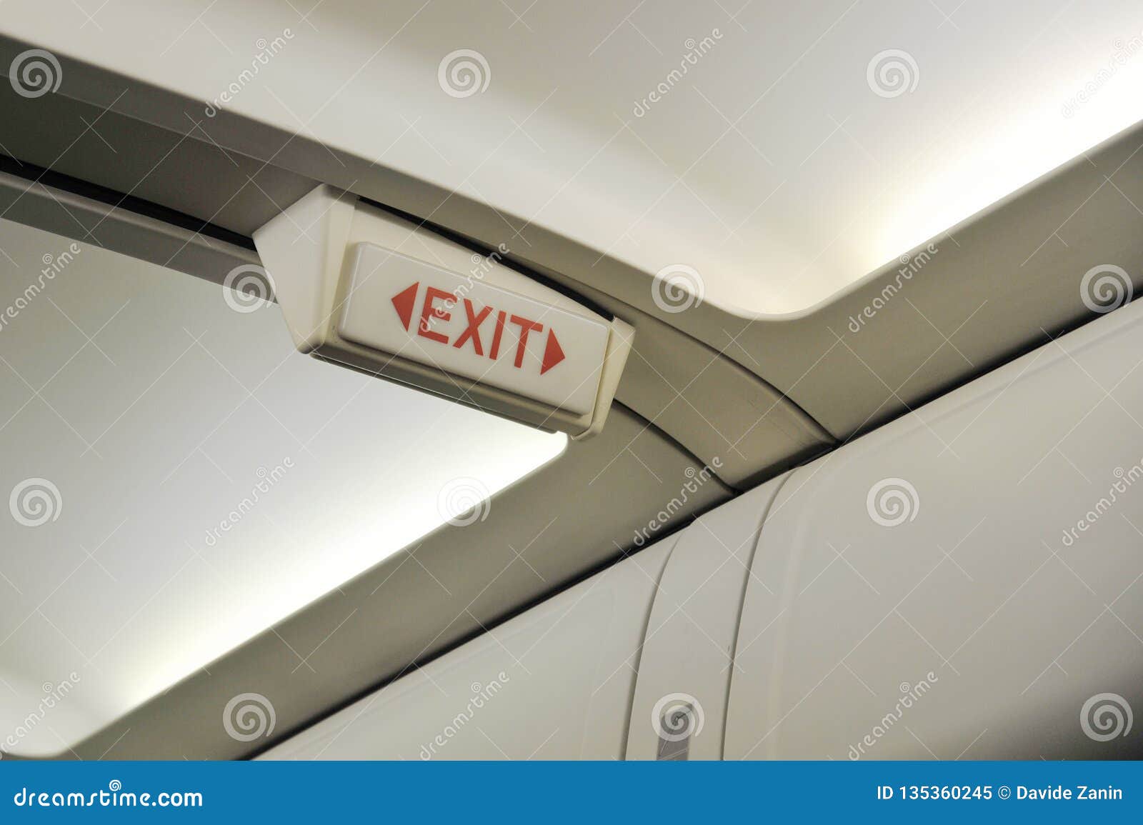 Close Up of Exit Sign in Passenger Airplane Stock Image - Image of ...