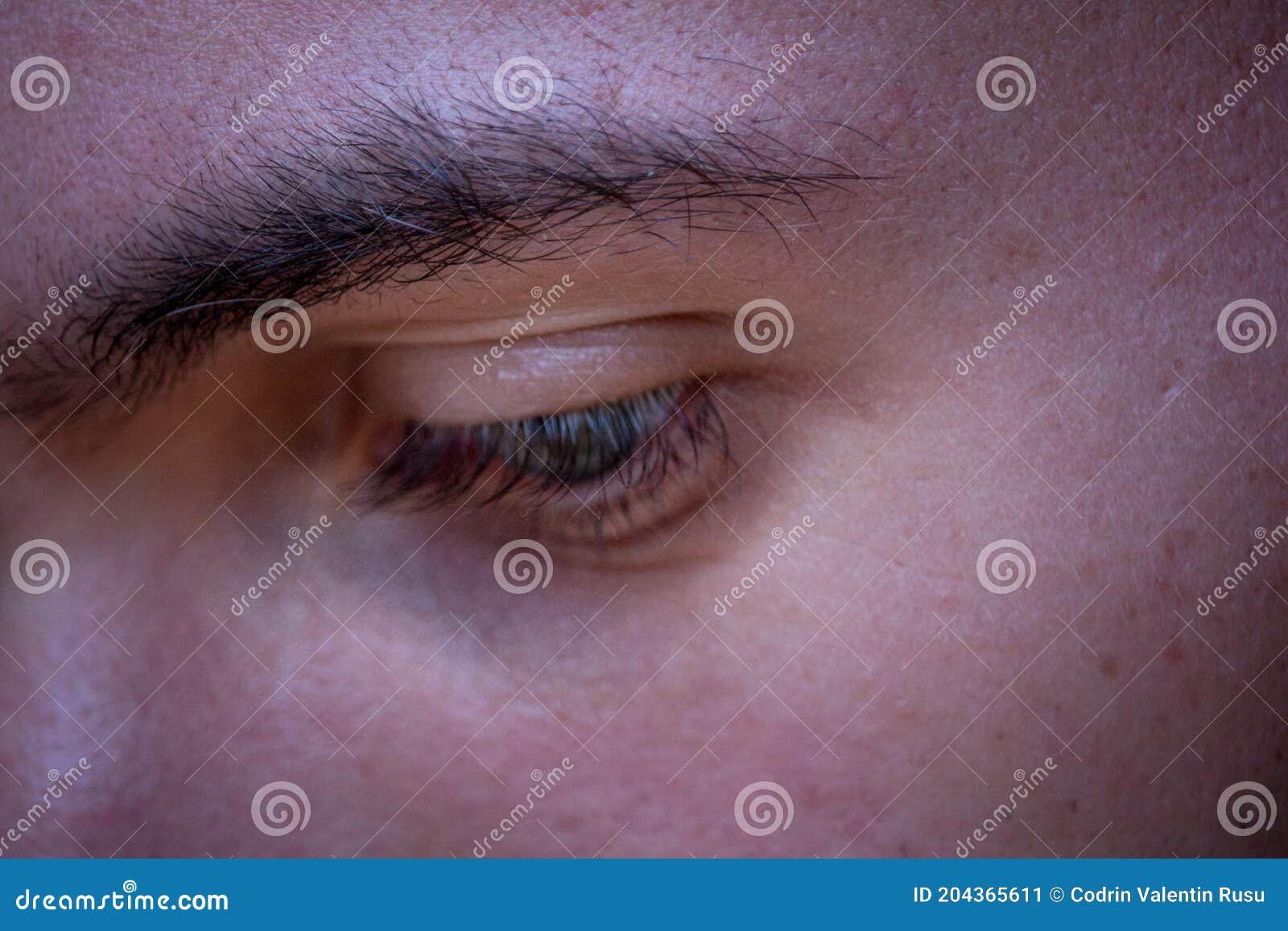 Close Up of Eye and Eyebrow with Darker Skin and Eye Looking Down Stock ...