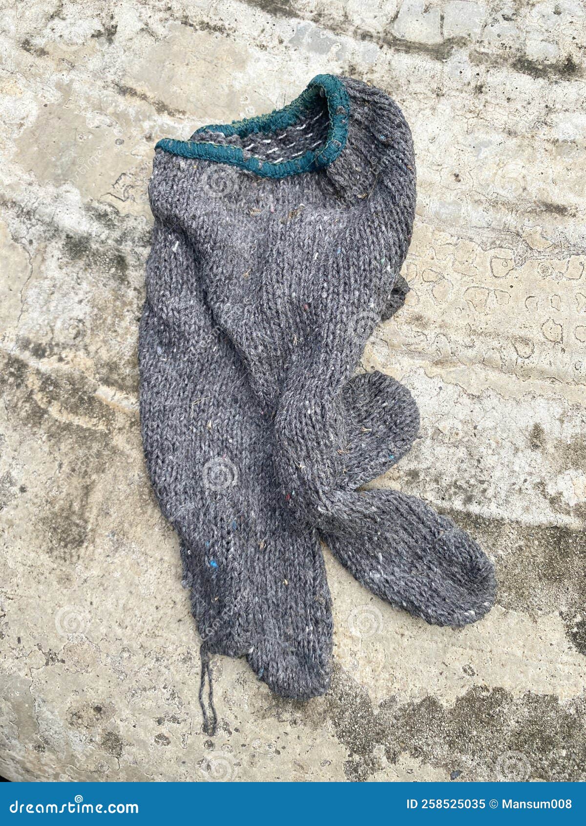 Fabric glove on the ground stock image. Image of fabric - 258525035
