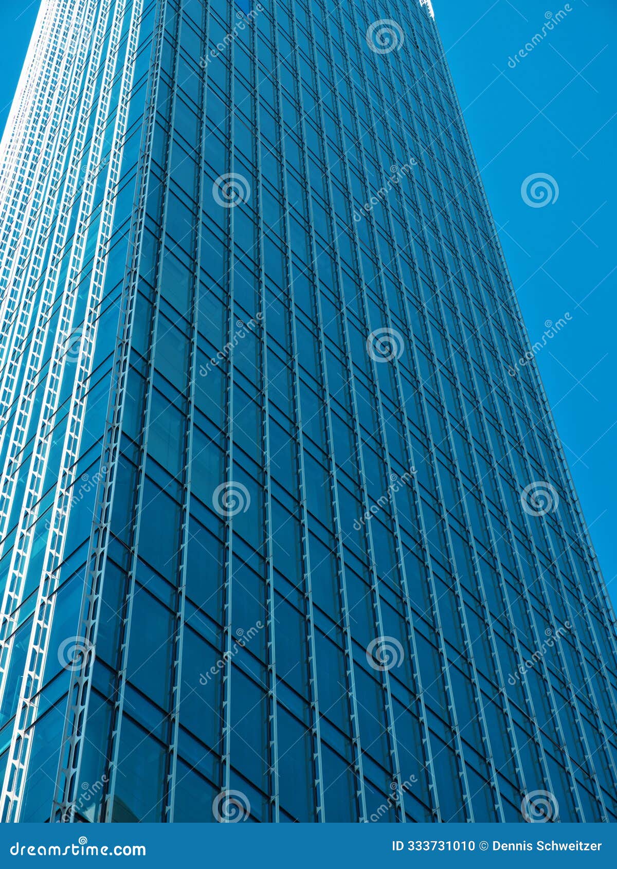 Close-up of the Facade of a High-rise Building with Large Windows and a ...