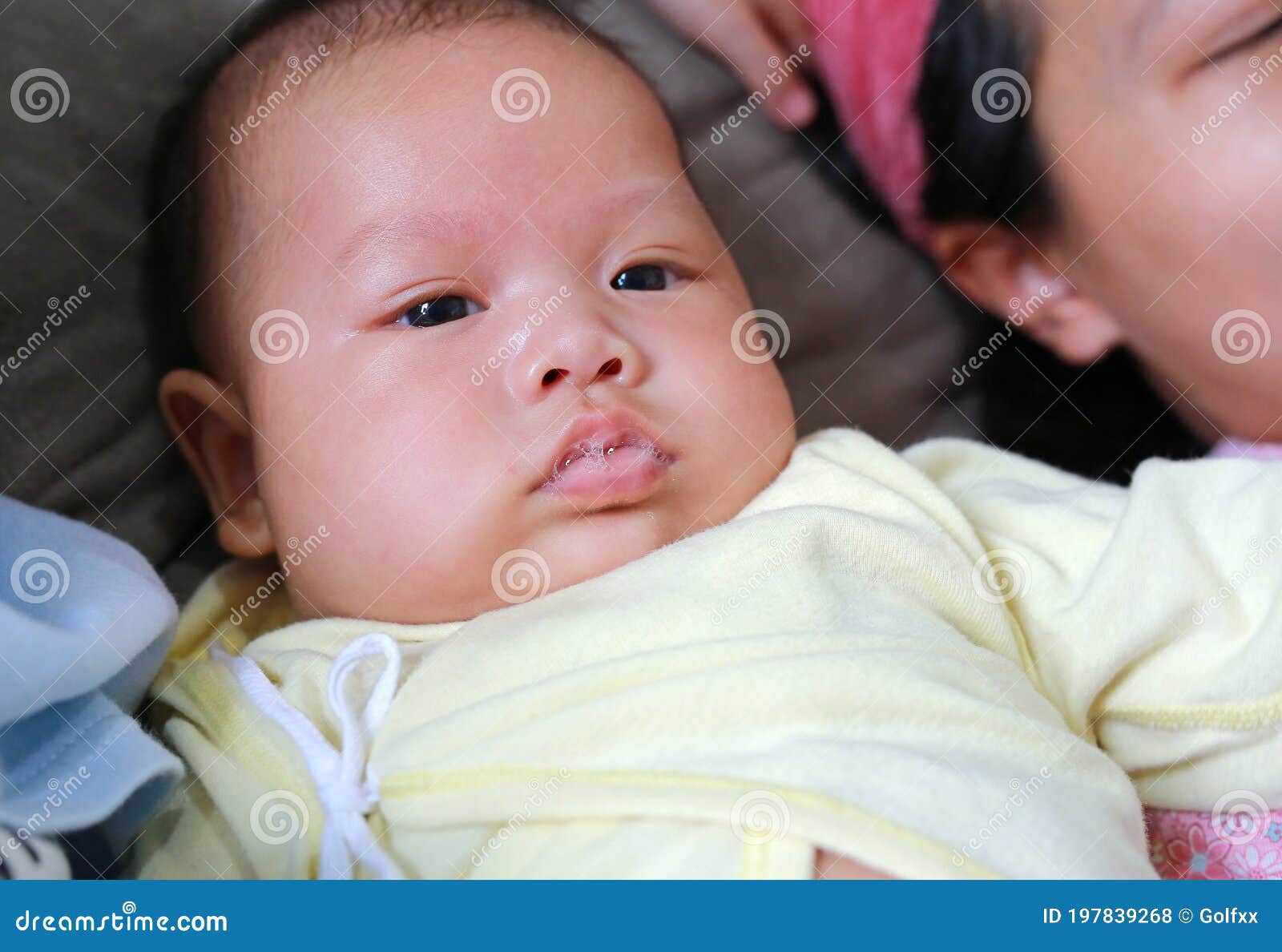 Close Up Face of Asian Infant is Playing Saliva Stock Photo - Image of ...