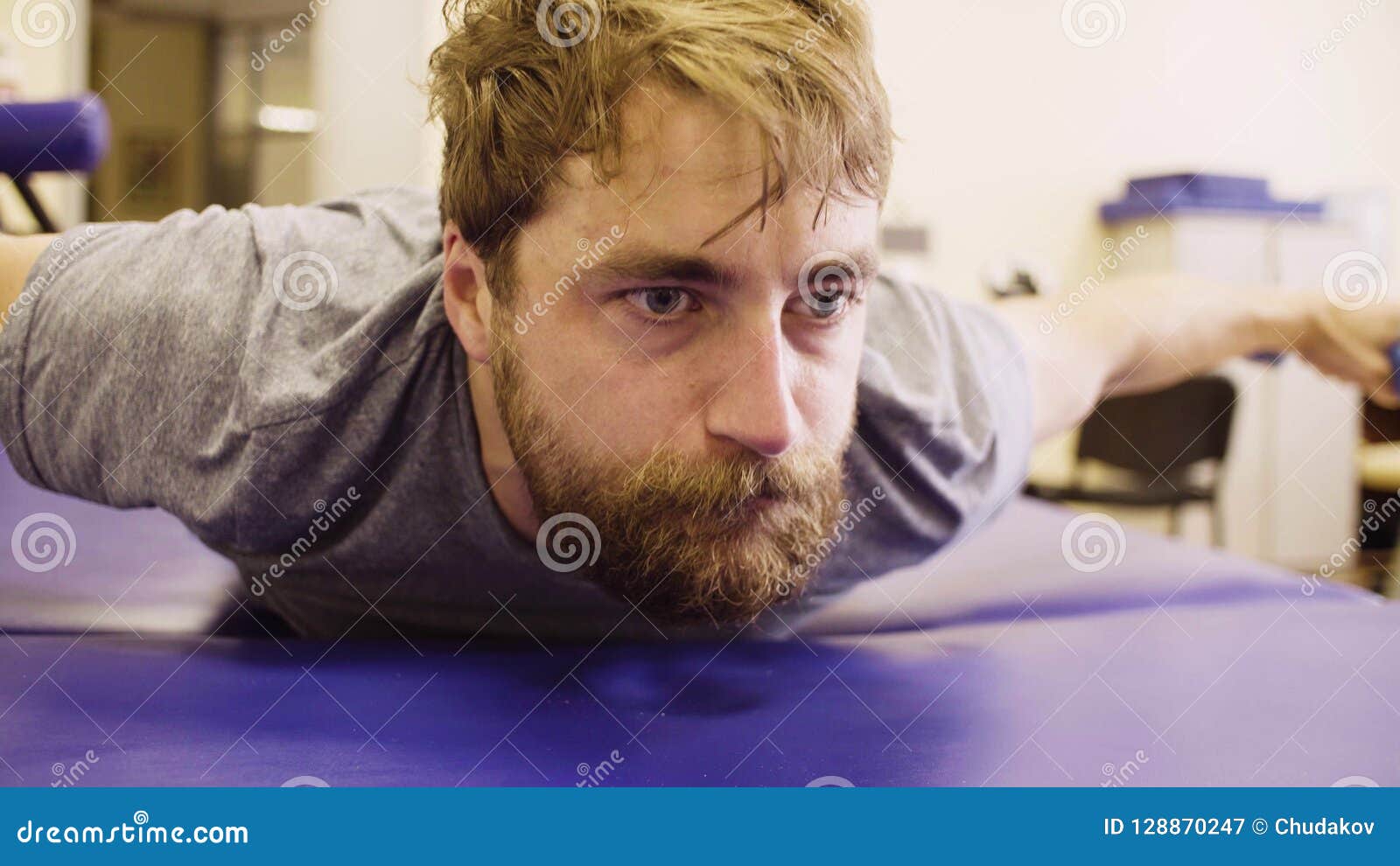 Face of a Disable Man during Exercises at the Rehabilitation Clinic ...