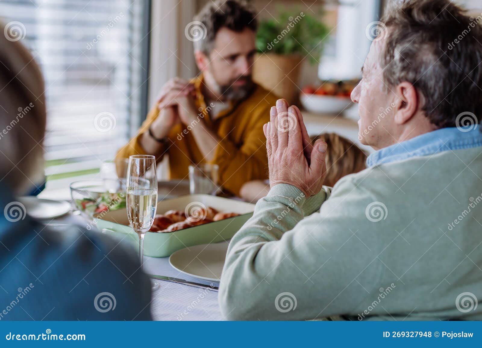 Close-up of Family Praying before Easter Lunch. Stock Photo - Image of ...