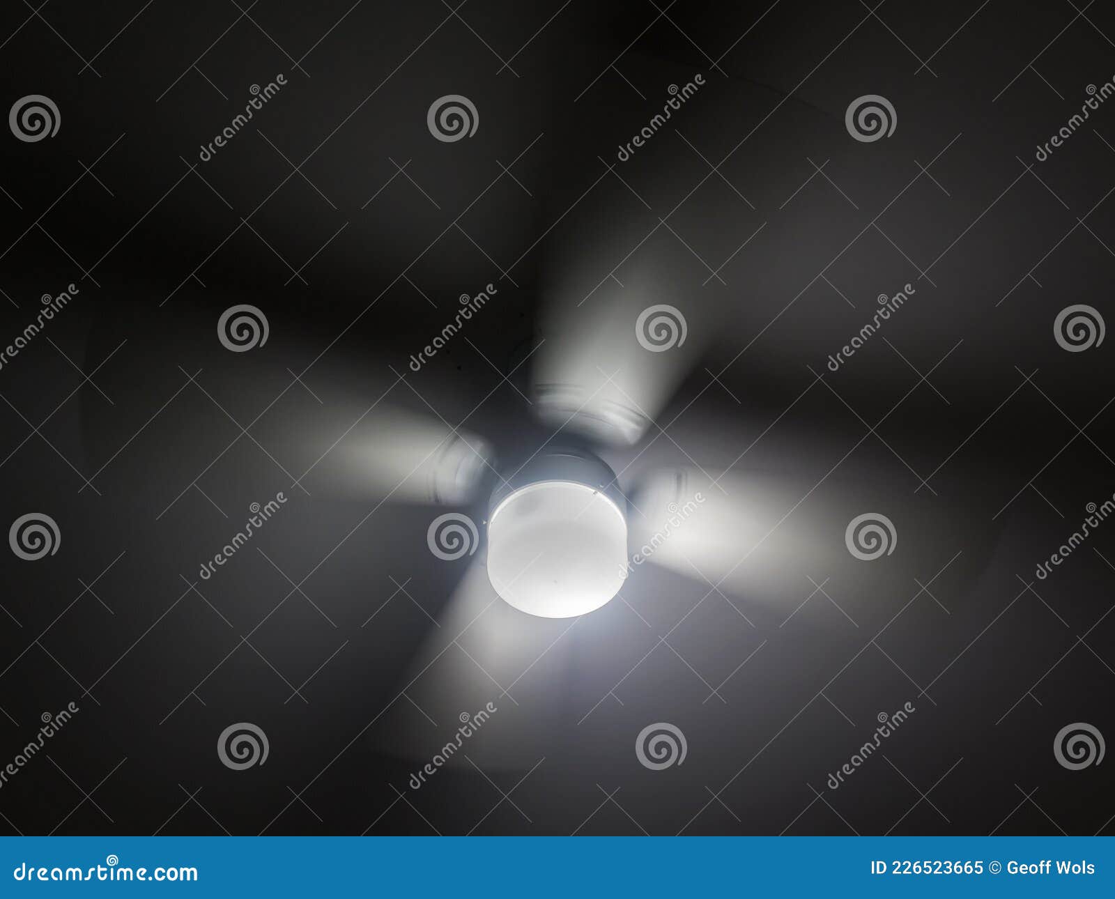 A Close Up of a Fan and Light on Ceiling Spinning Stock Image - Image ...