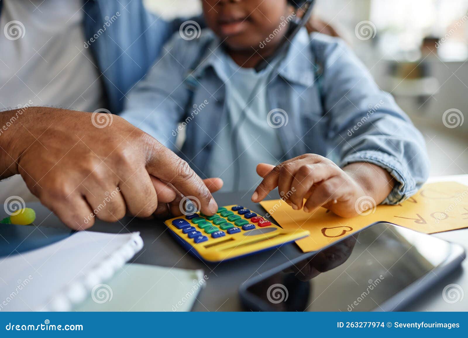 Close Up of Father and Child Playing with Toy Calculator Stock Photo ...