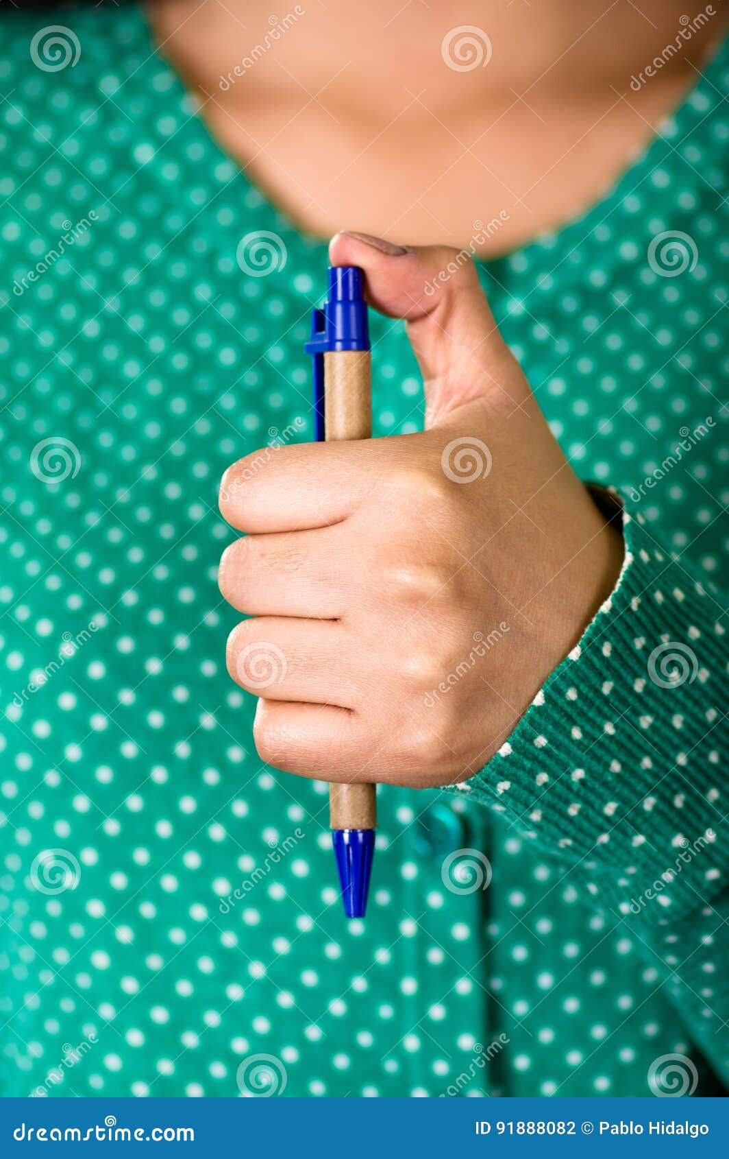 Close-up of a Female Hand Holding a Pen. Fiddling Concept Stock Photo ... Close-up of a Female Hand Holding a Pen. Fiddling Concept Stock Photo ...