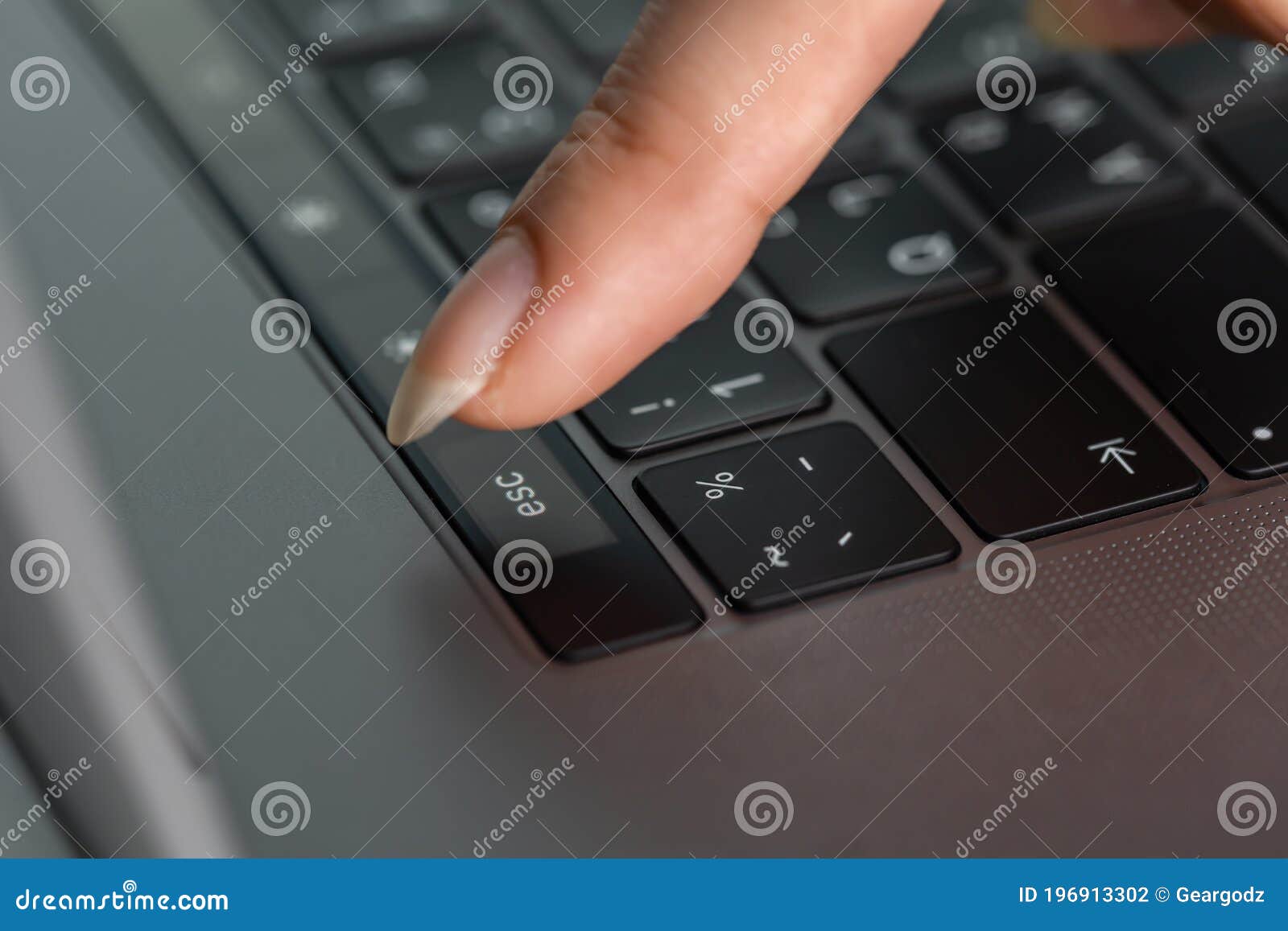 Close-up Female Hand Pressing Esc Button on Laptop Keyboard Stock Photo ...