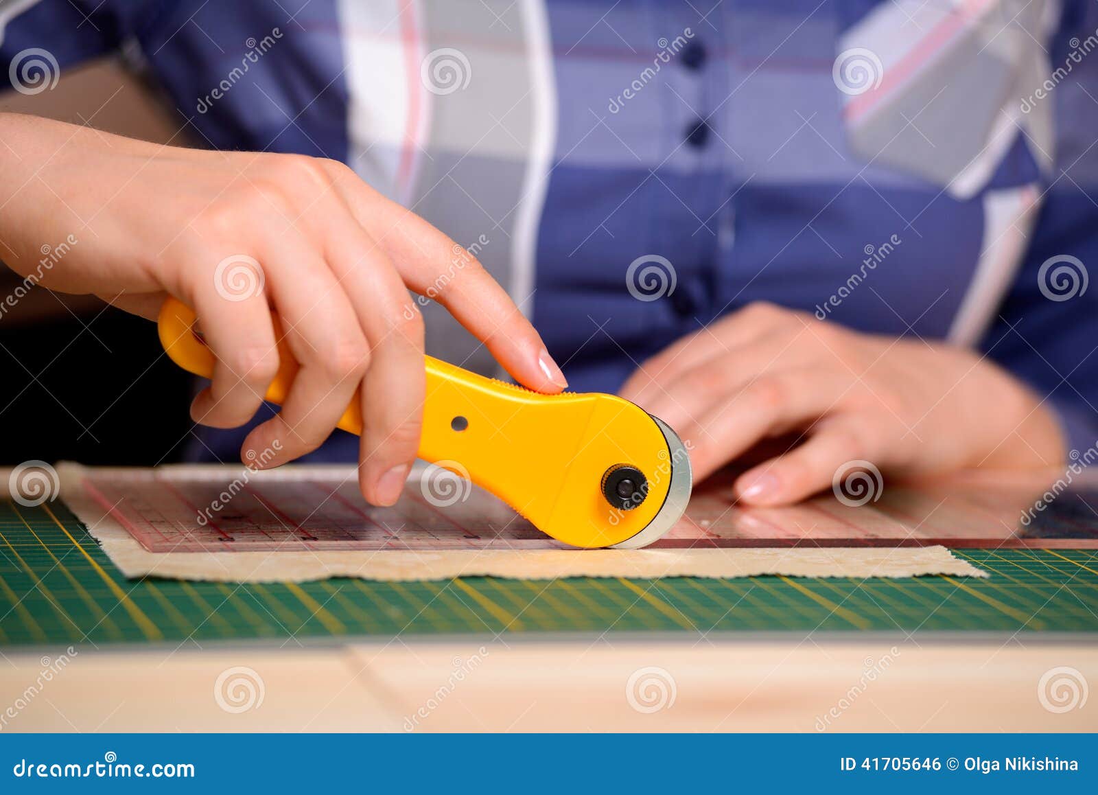 Close-up Female Hands Cutting Fabric with Patchwork Rotating Cutter ...