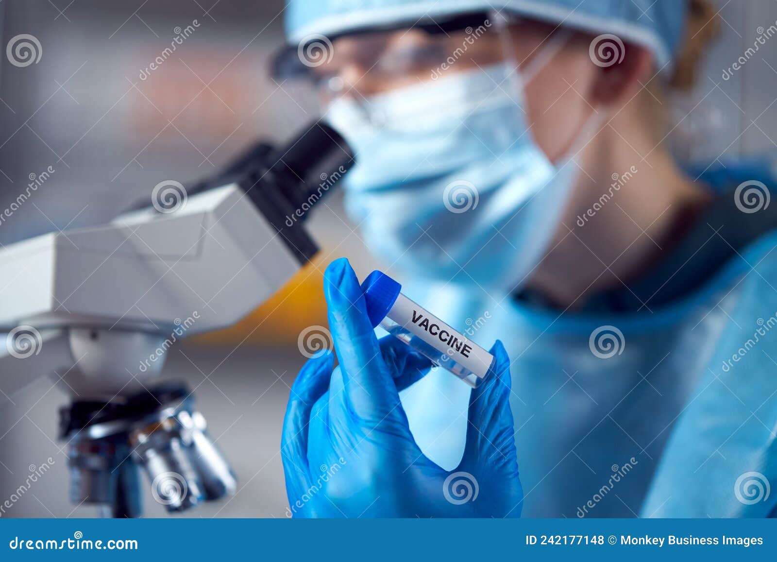 Close Up of Female Lab Worker Wearing PPE Researching Vaccine with ...