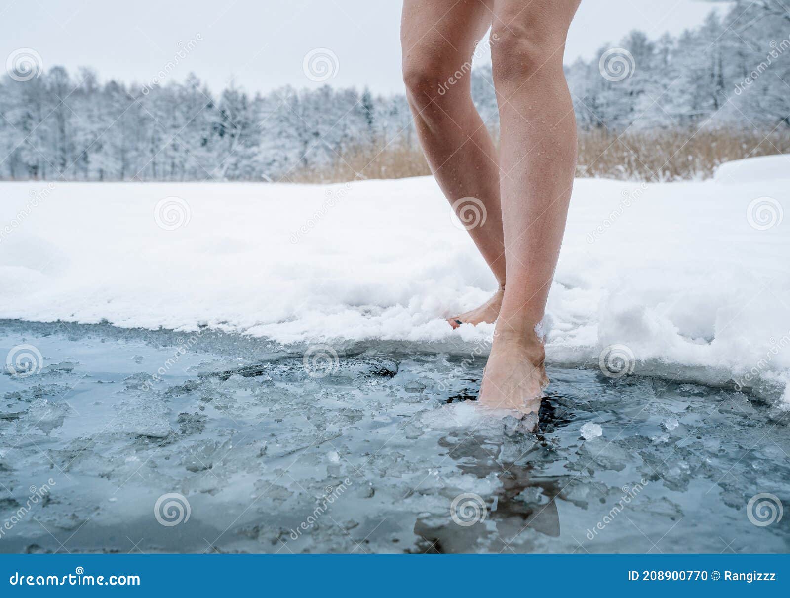 Close Up of Female Legs Getting into Ice Cold Water Stock Photo - Image ...