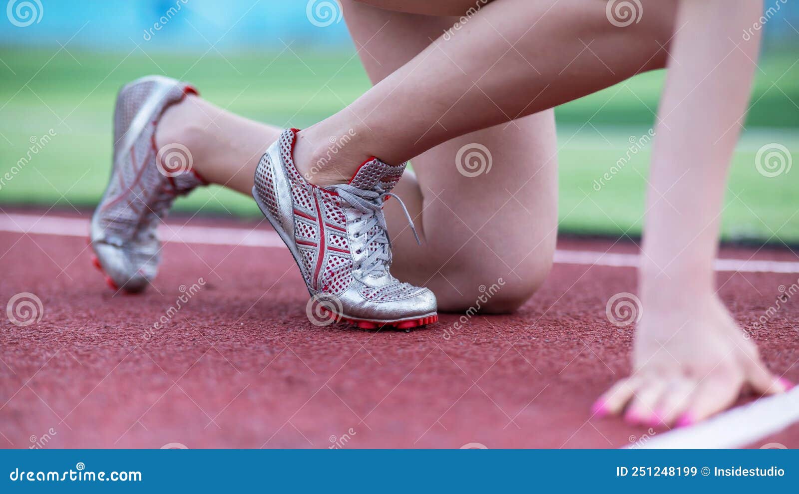 Close-up of Female Legs. the Runner in the Stadium is Ready for the ...