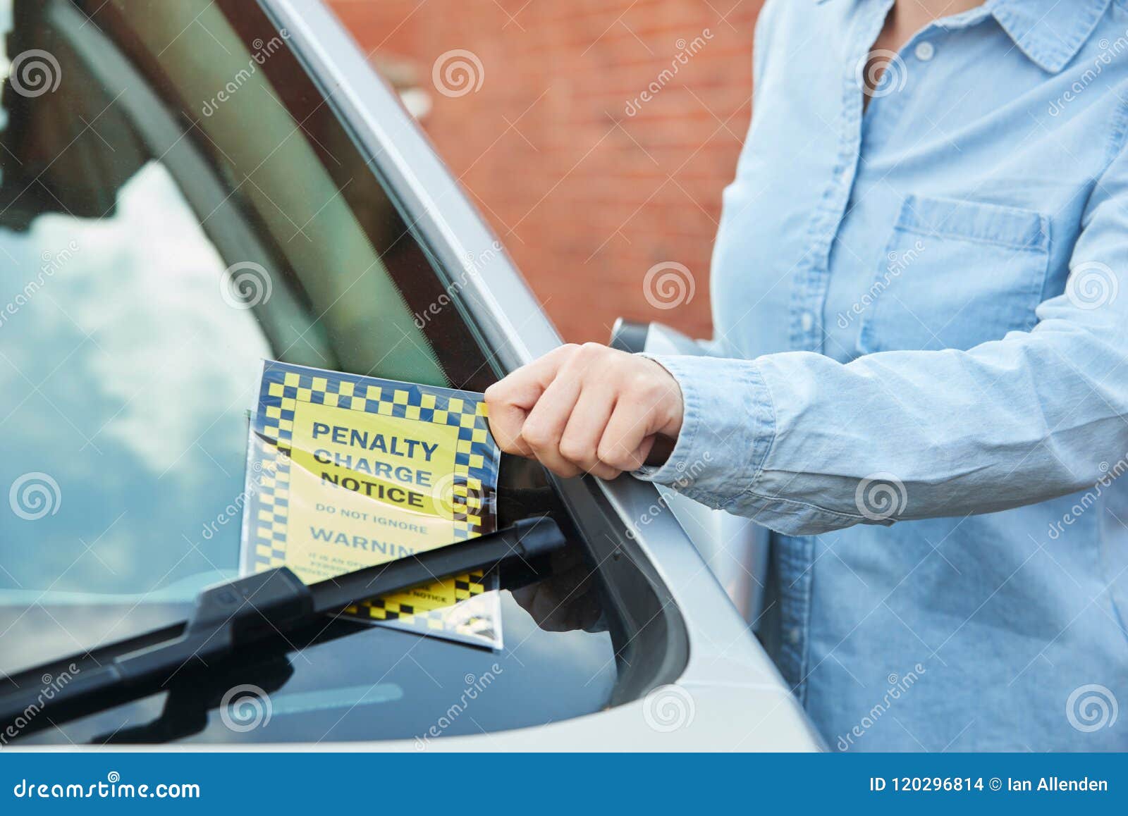 Close Up of Female Motorist Looking at Parking Ticket Stock Photo ...