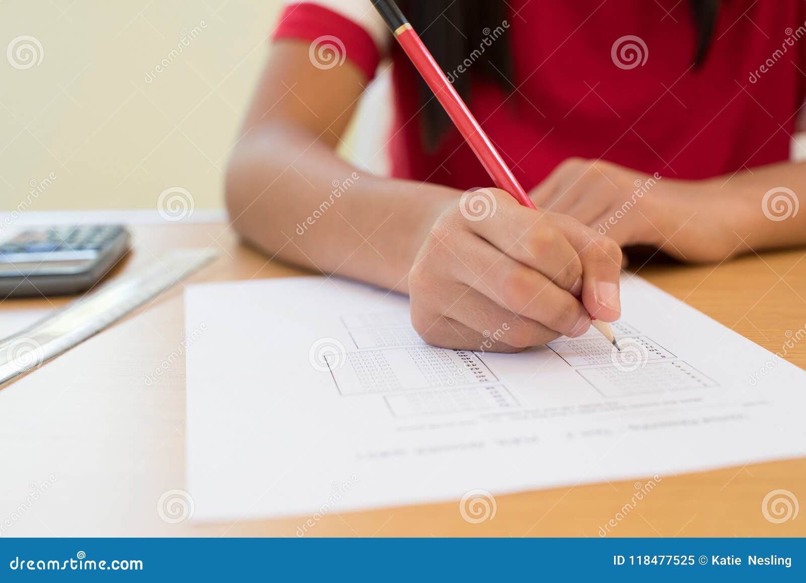 Close Up of Female Pupil Taking Multiple Choice Examination Paper Stock ... Close Up of Female Pupil Taking Multiple Choice Examination Paper Stock ...