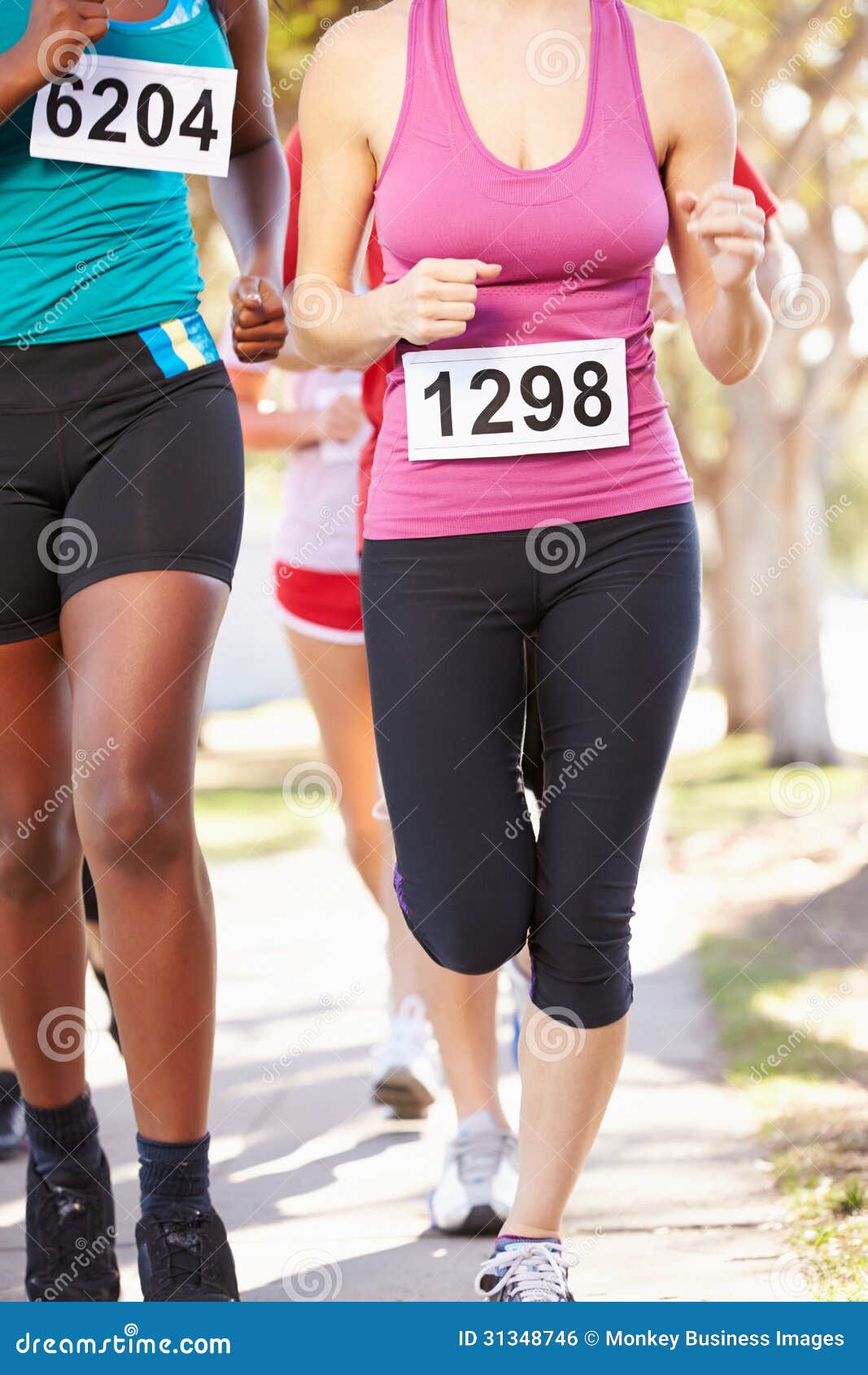 Close Up of Female Runners in Race Stock Photo - Image of thirties ...