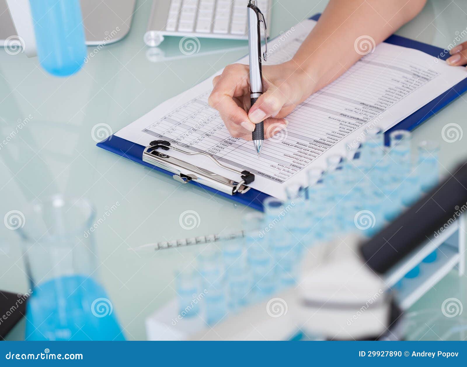 Female Scientist Writing on Notepad Stock Photo - Image of biochemical ...