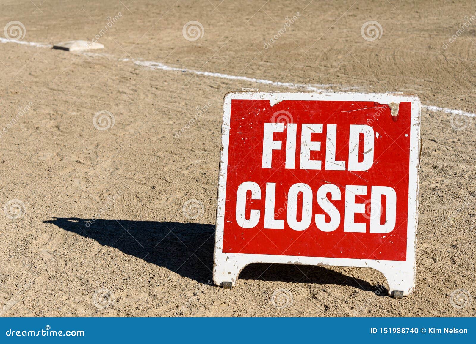 Close Up of Field Closed Sign on Empty Local Baseball Field, Third Base ...