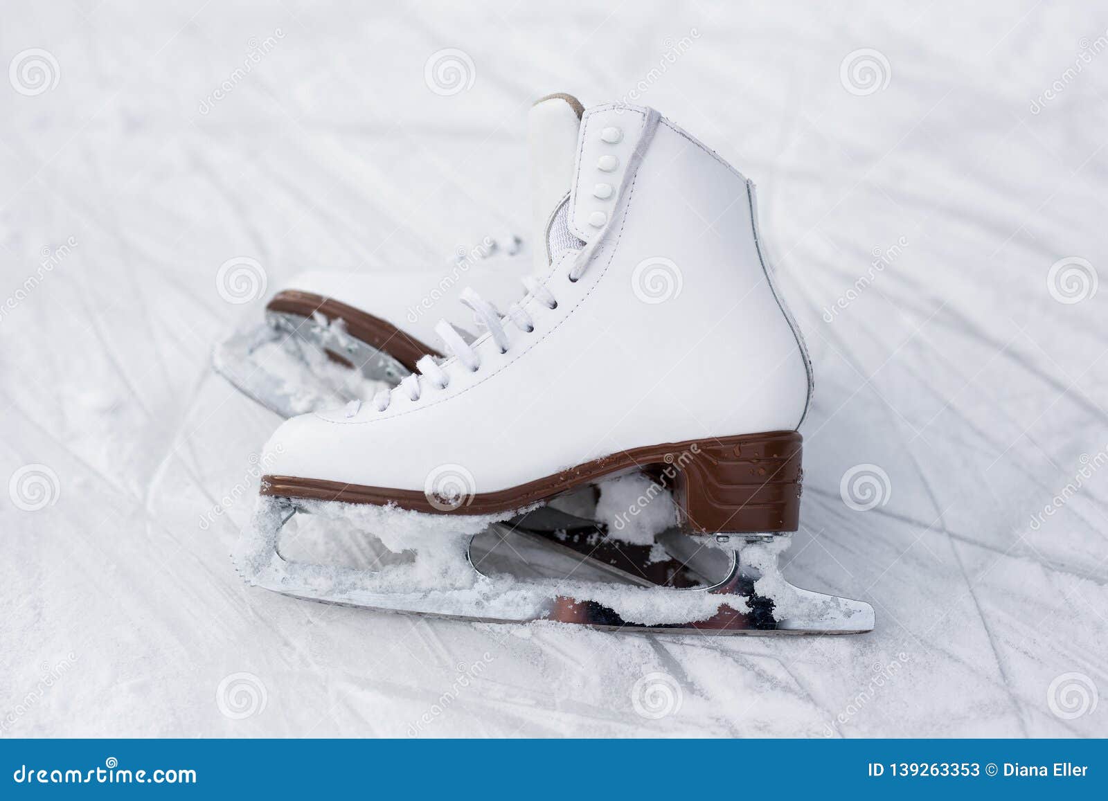 Close Up of Figure Skates Over Ice with Marks from Skating Stock Image ...