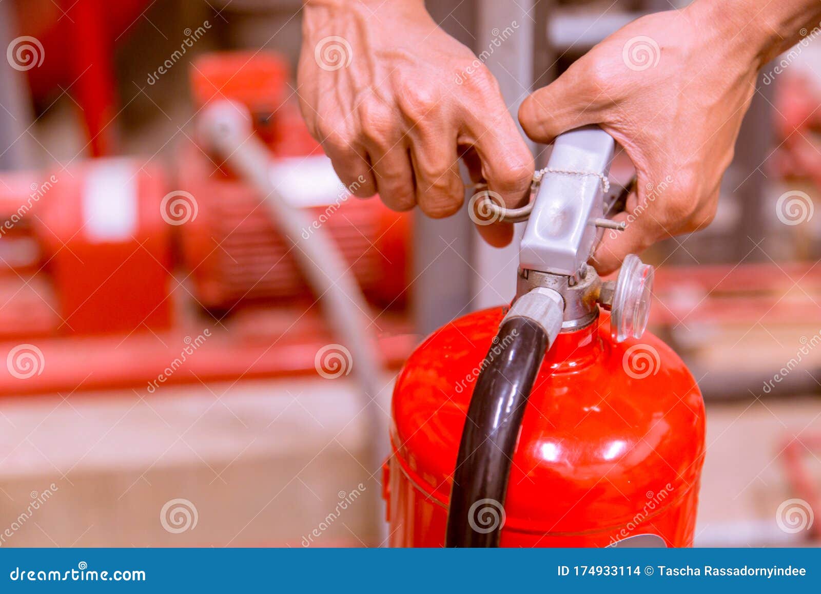Close Up Fire Extinguisher and Pulling Pin on Red Tank Stock Photo ...