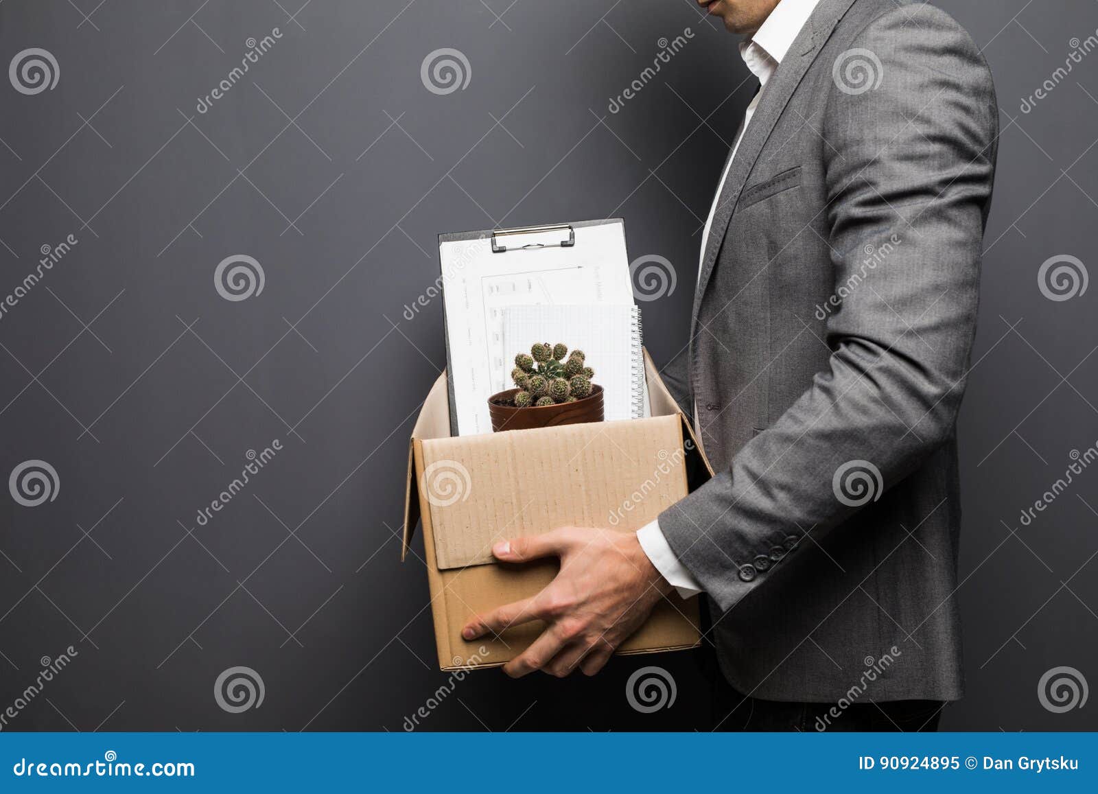 Close Up of Fired Man Employee Hiding Behind Box with Personal Items on ...