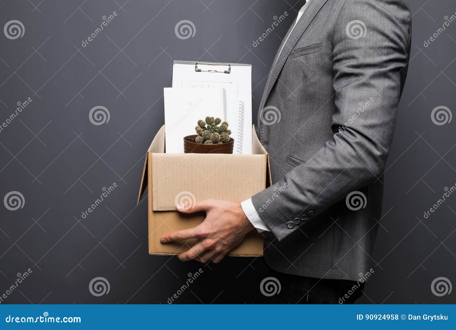 Close Up of Fired Man Employee Hiding Behind Box with Personal Items on ...