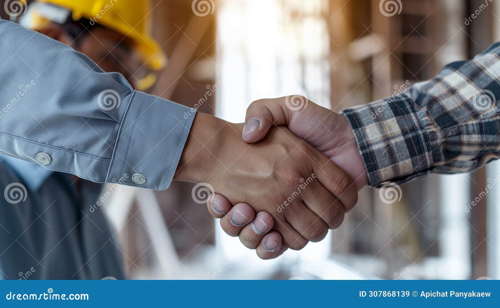 Construction Workers Handshake at Job Site Stock Image - Image of ...