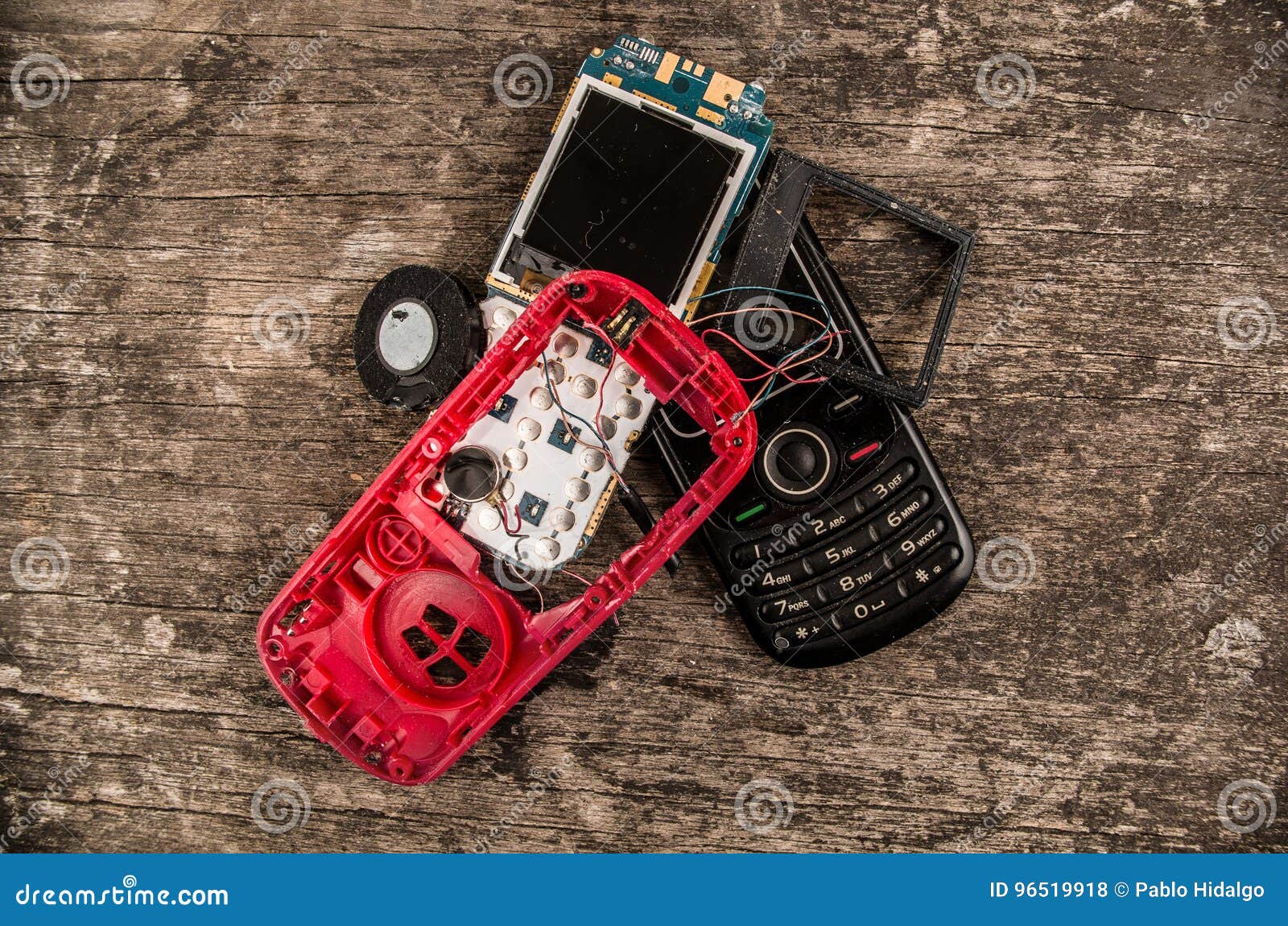 Close Up of First Generation Mobile Cellphone on Wooden Background ...