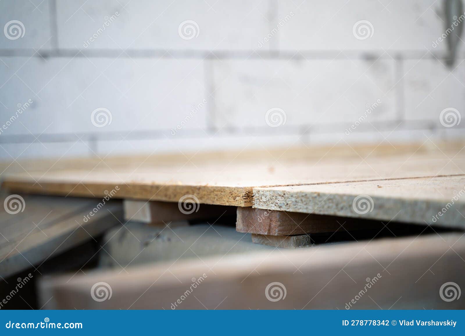 Leveling The Floor With A Long Spatula. Builder Levels A Laid Floor ...