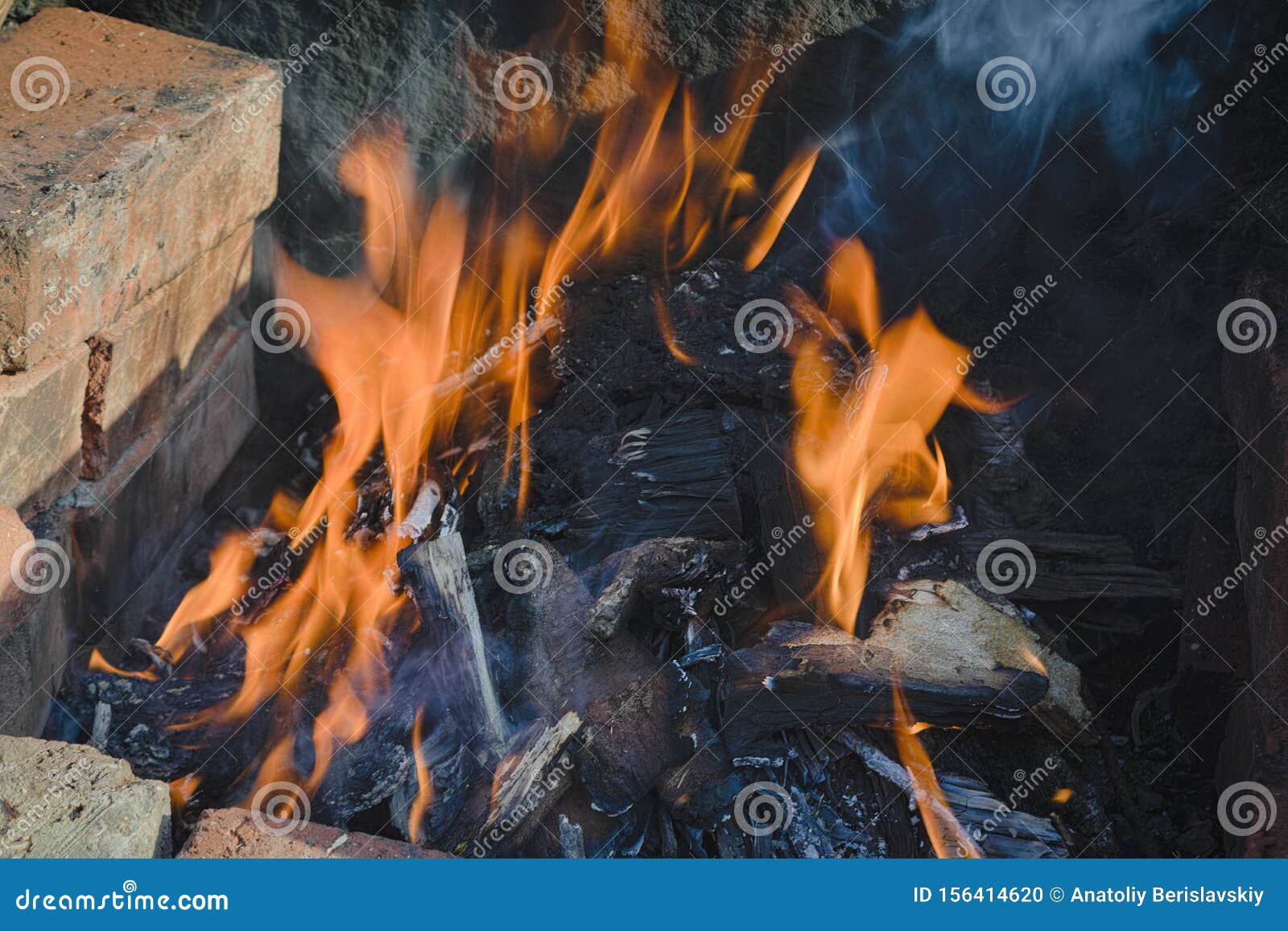 Close-up Flame in a Makeshift Barbecue Made of Bricks Stock Photo ...