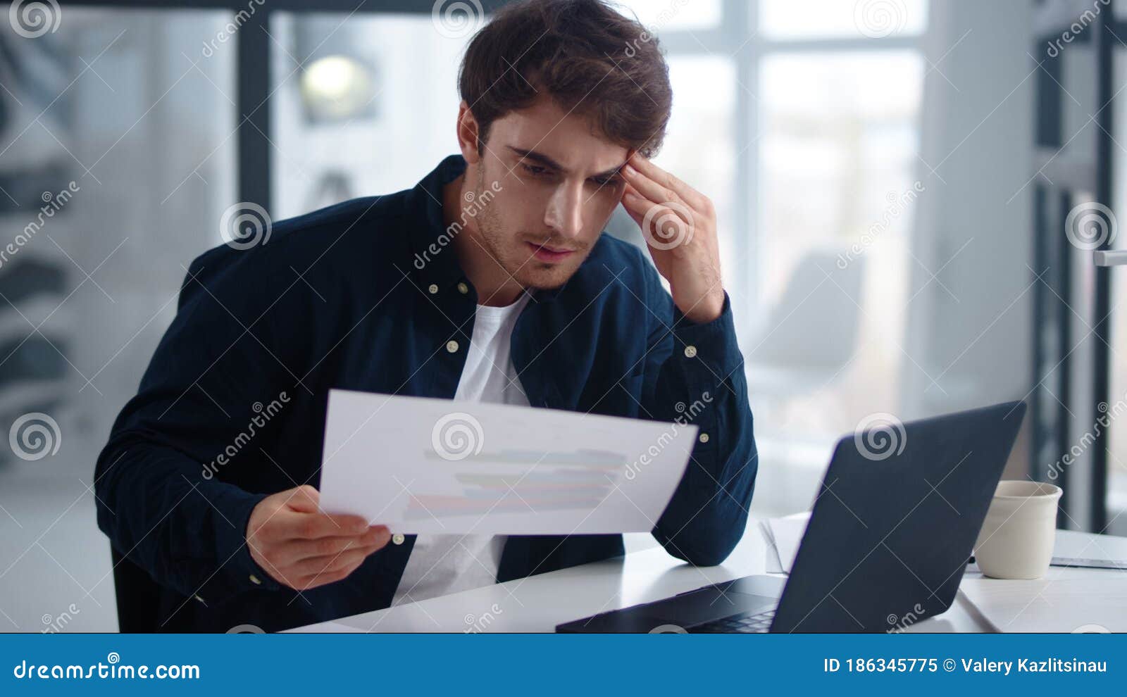 Focused Business Man Reading Documents. Serious Guy Checking Data in ...