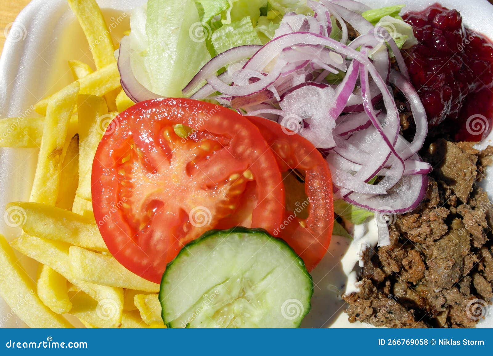 Close Up of Food on a Paper Plate Stock Photo - Image of tomato, sauce ...