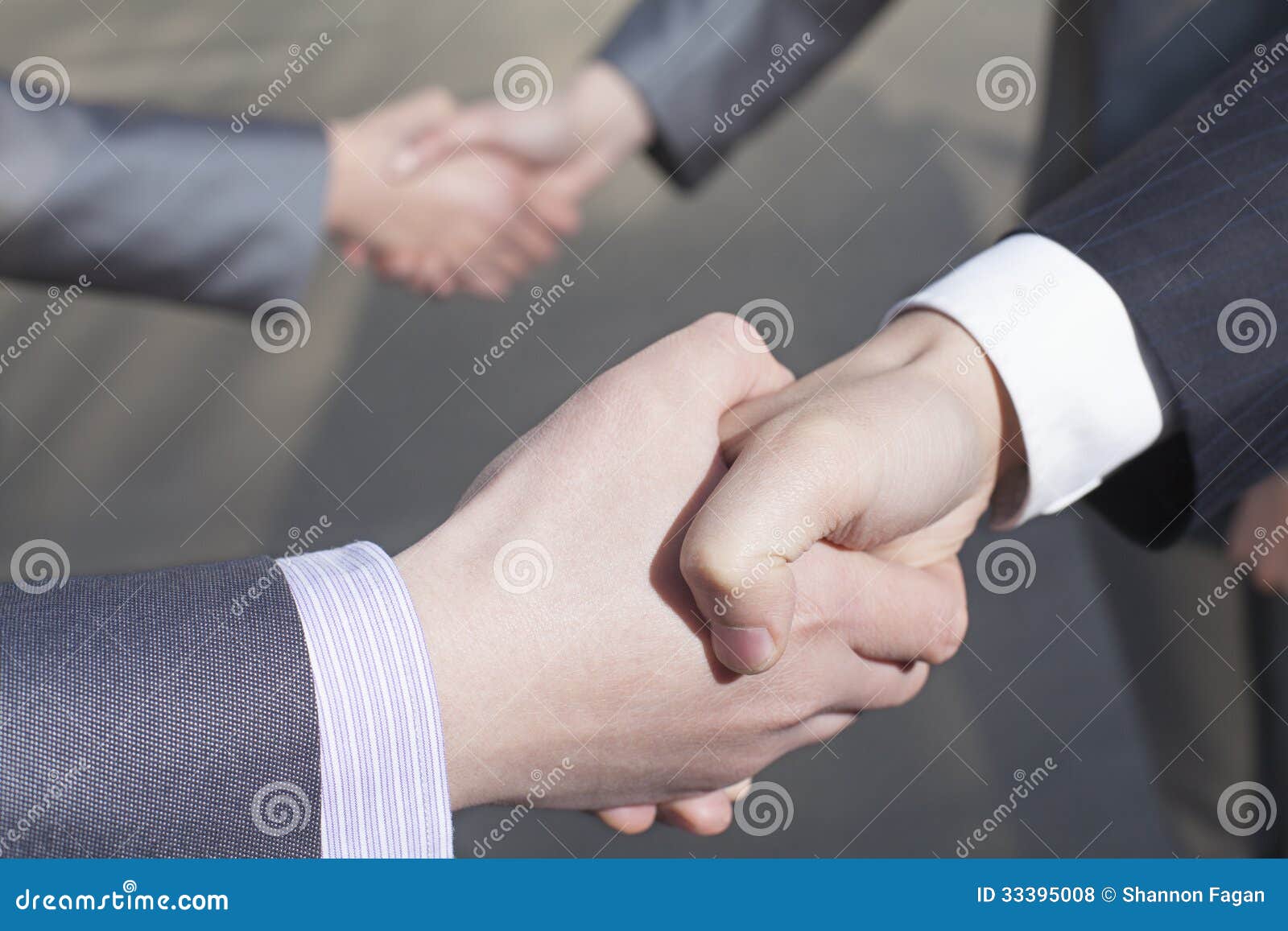 Close Up of Four Business People Shaking Hands Stock Photo - Image of ...