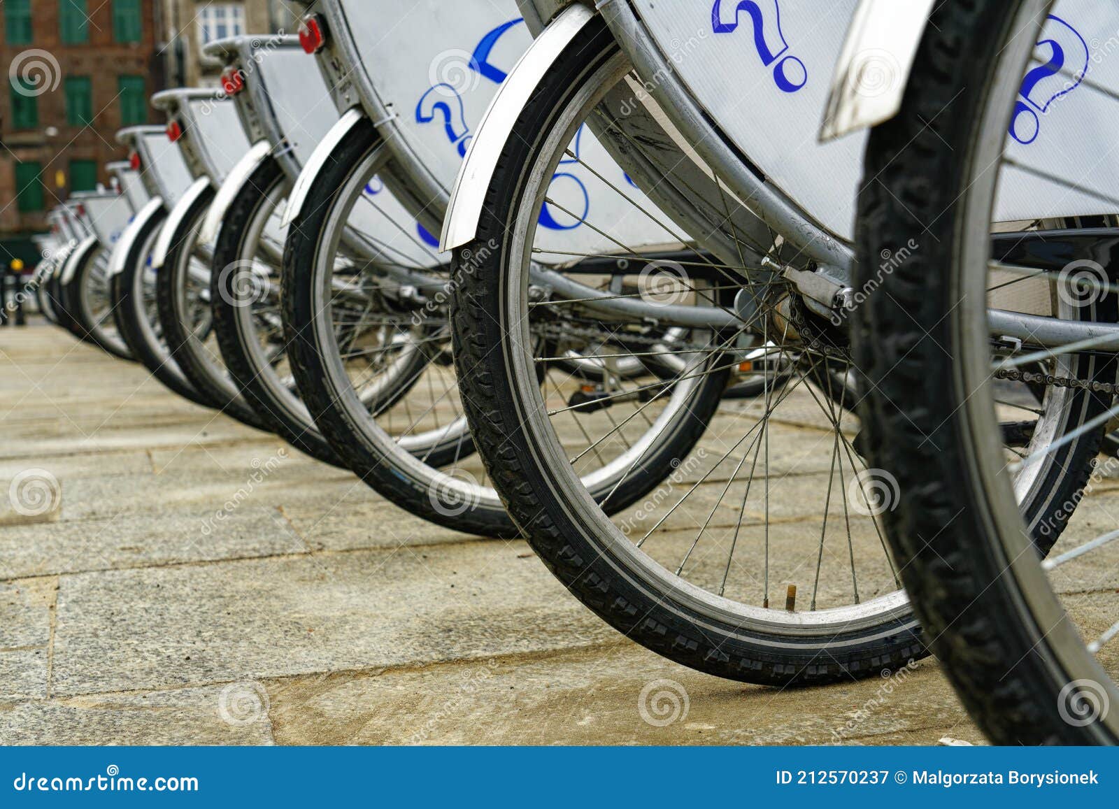 Close Up Of A Fragment Of City Bike Wheels For Rent By The Hour Winter