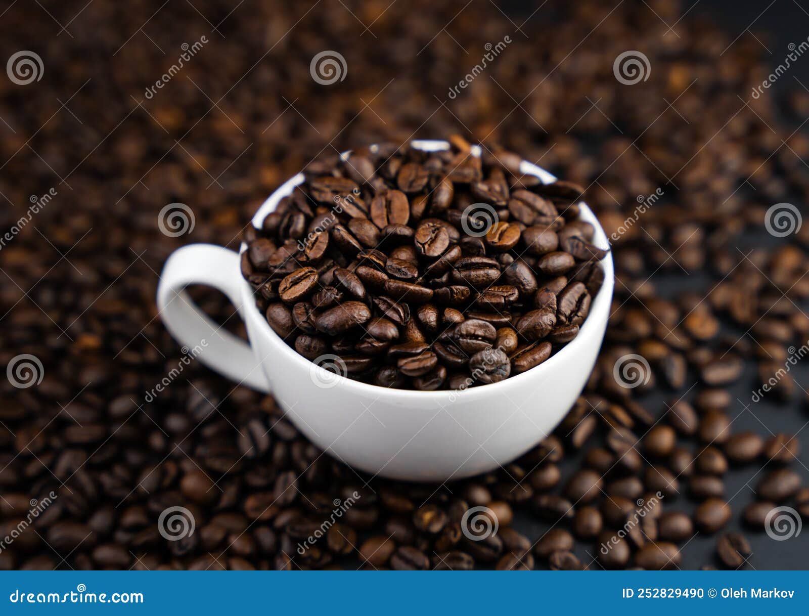 Close Up of a Fragrant Coffee Beans in a White Cup on a Coffee Beans on ...