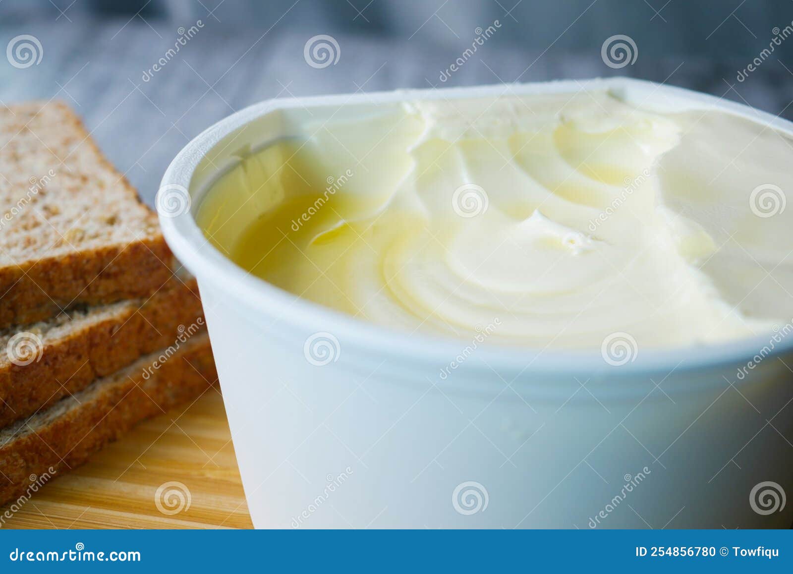 Close Up of Fresh Butter in a Container Stock Photo - Image of food ...