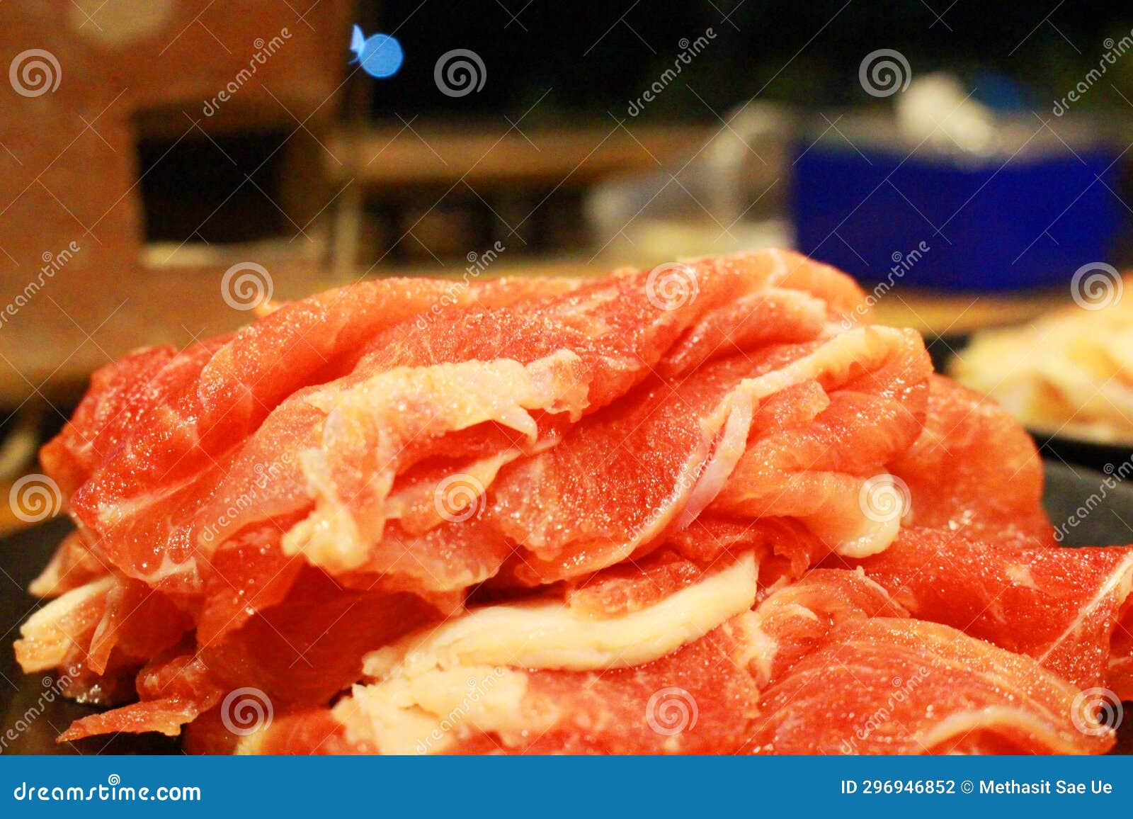 Close-up of Fresh Raw Pork in a Black Plate Stock Photo - Image of ...