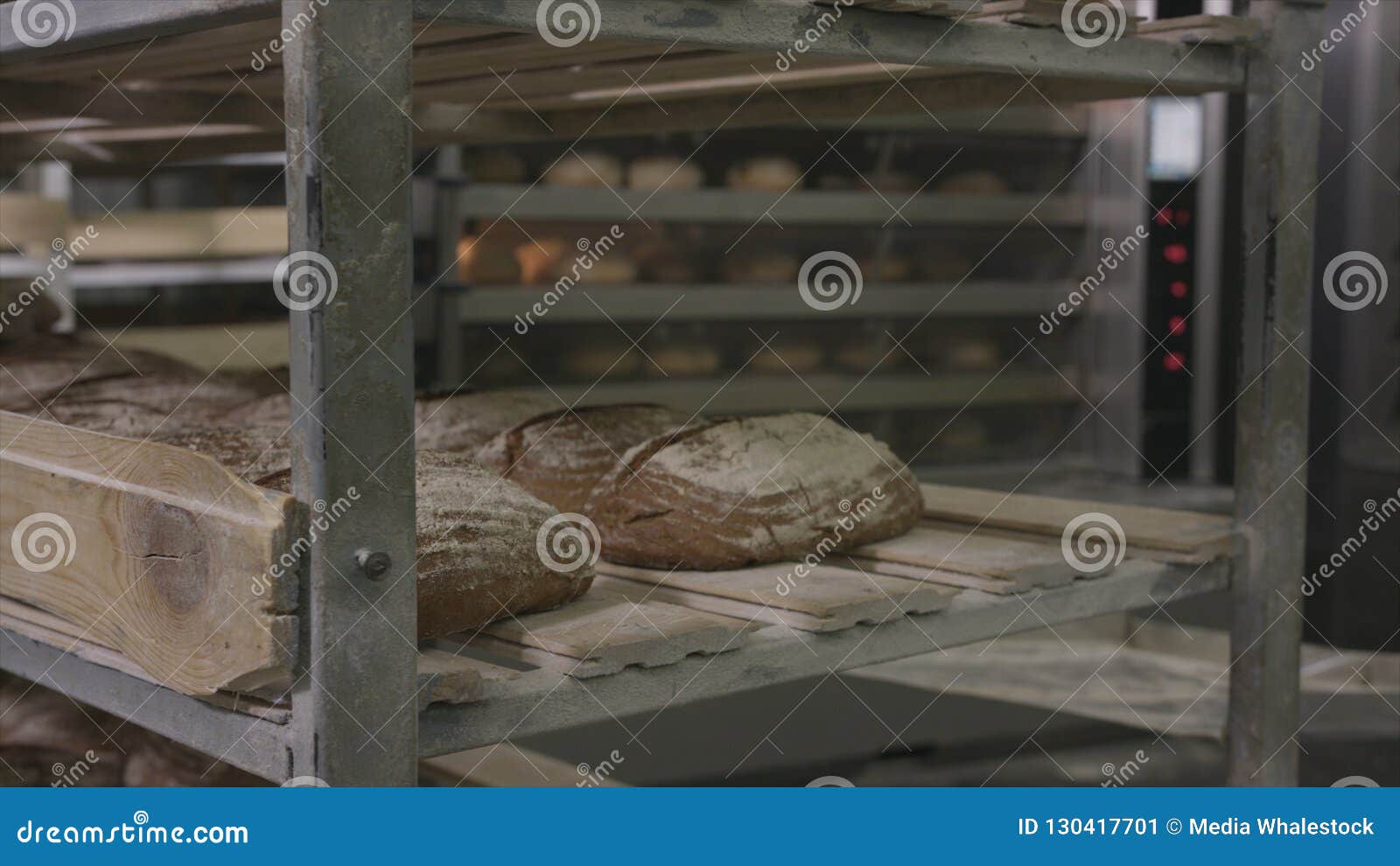 Close-up of Freshly Baked Bread at Bakery. Scene. New Baked Batch of ...