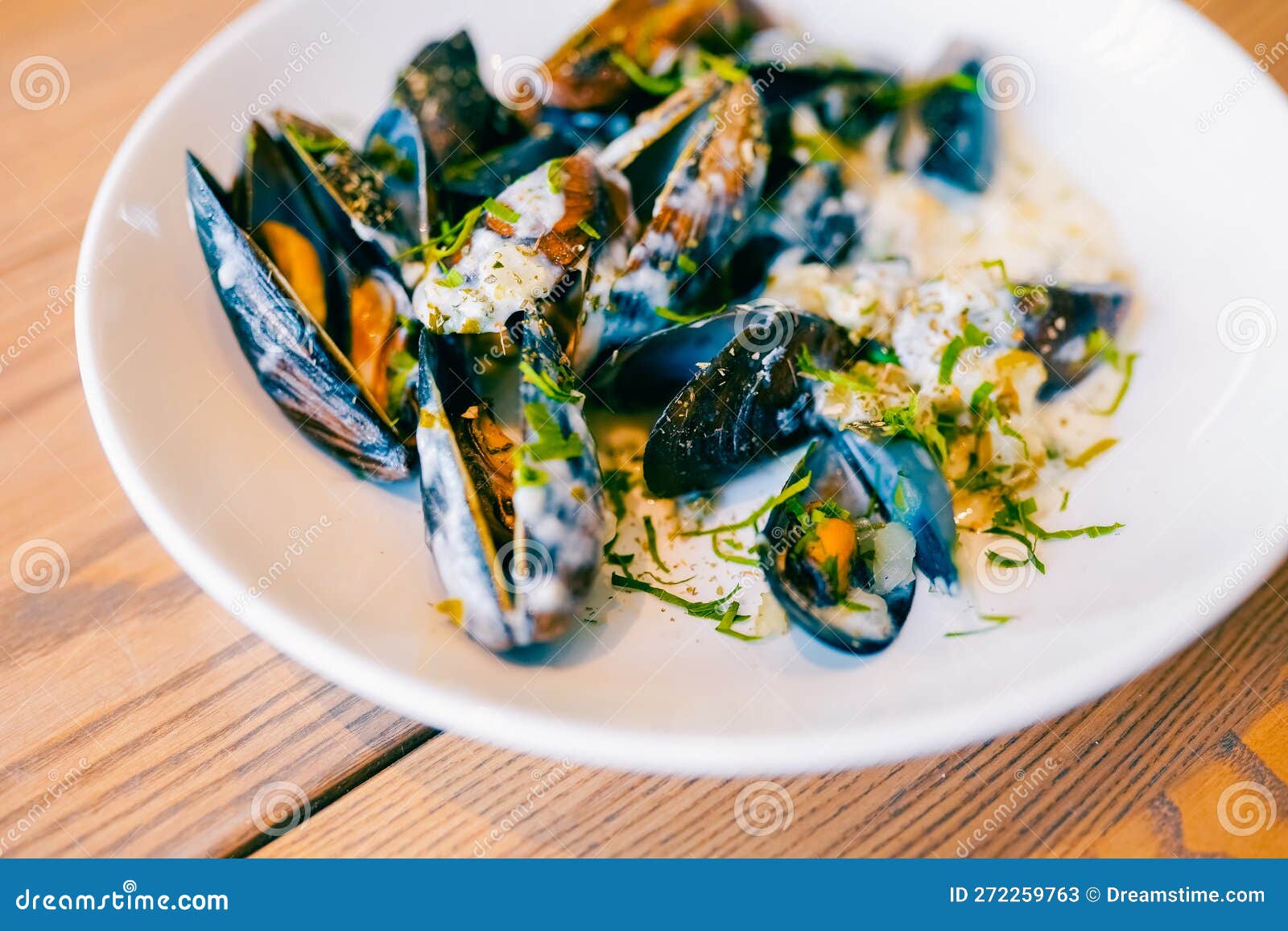 Close Up of Freshly Cooked Mussles in a Plate with Ingredients Stock ...