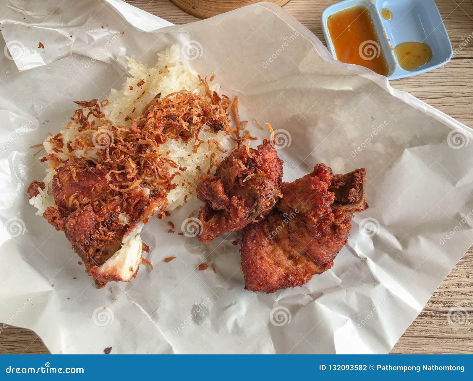 Fried Chicken and Sticky Rice on Paper Wrap Stock Photo - Image of ...