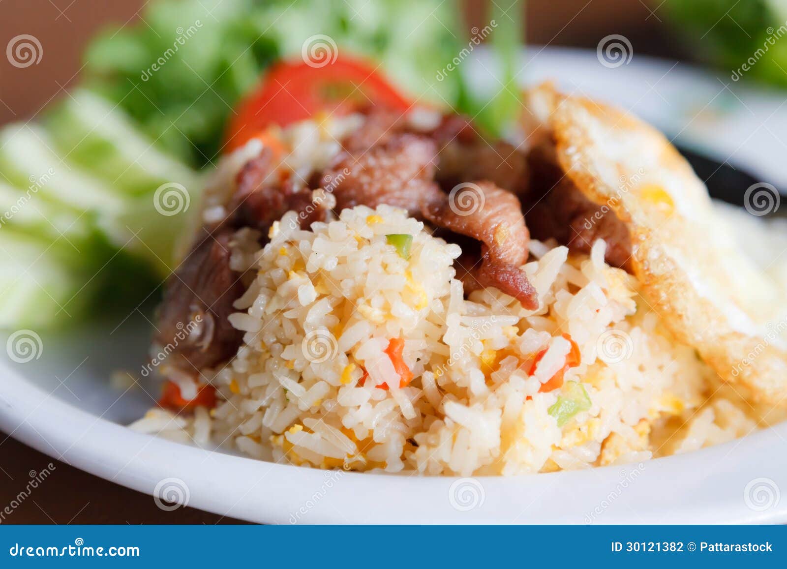 Fried Rice with Pork and Fried Egg Stock Photo - Image of cook, plate ...