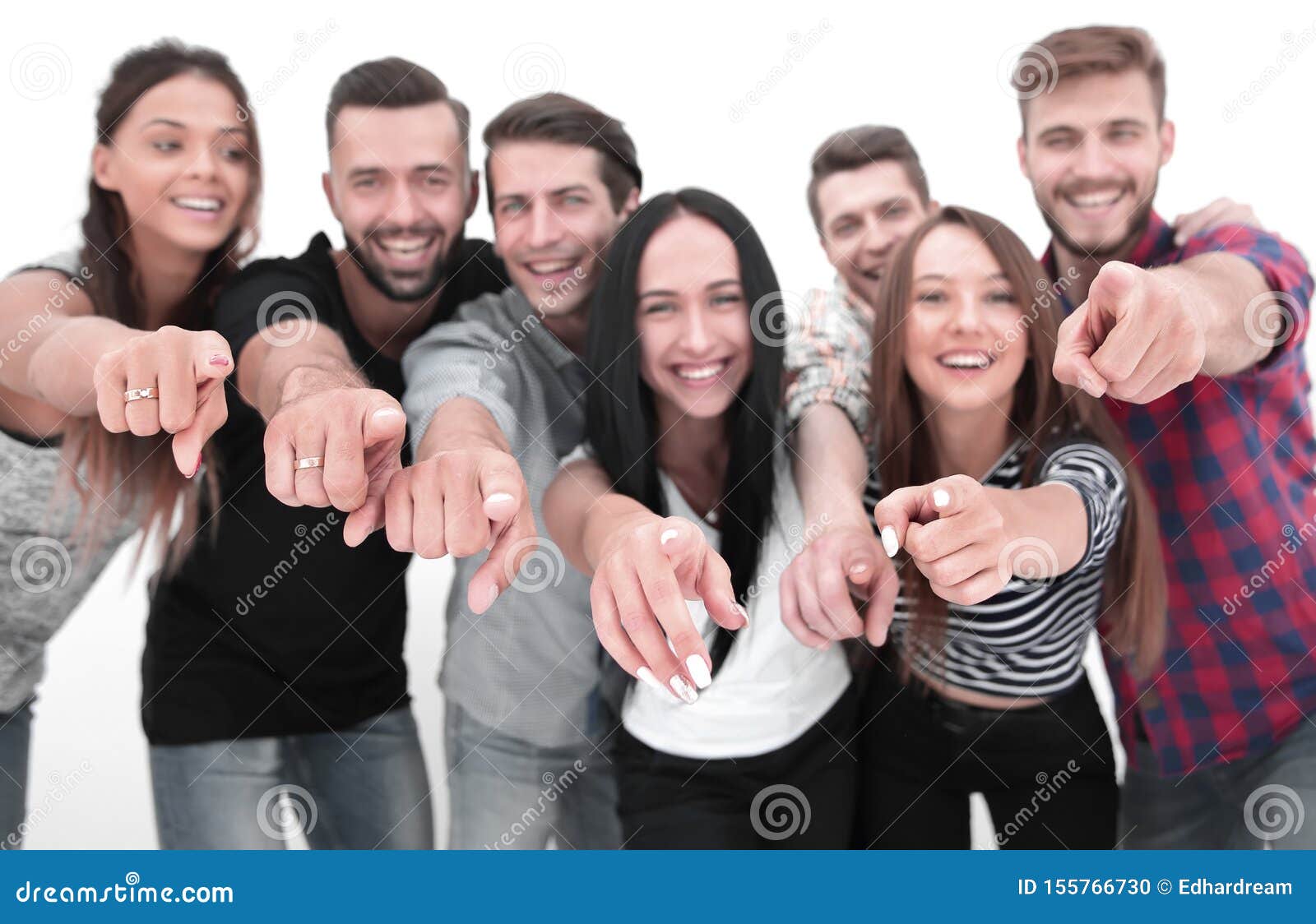 Close Up.a Friendly Team of Young Men Pointing at You Stock Photo ...