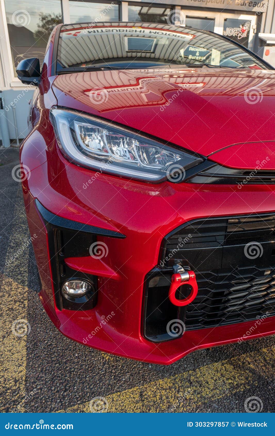 A Close Up of the Front Bumper of a Red Car Stock Image - Image of ...