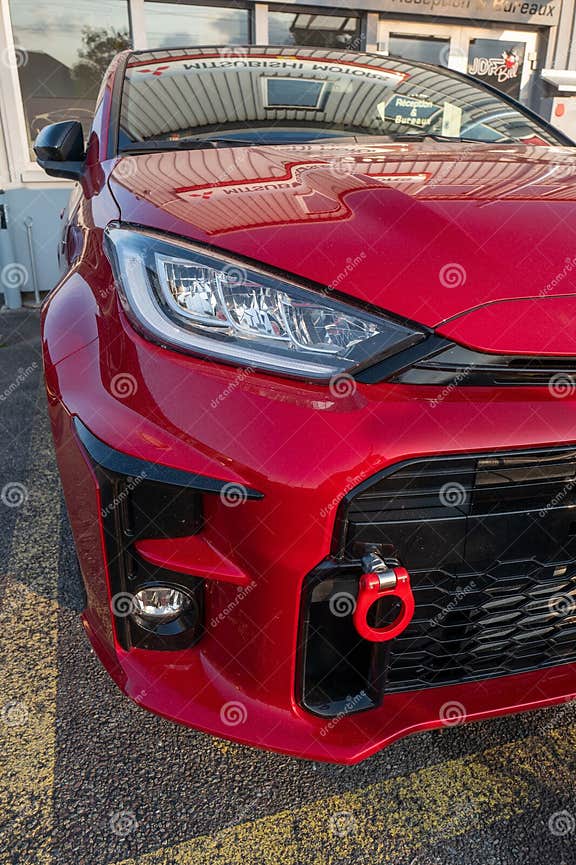 A Close Up of the Front Bumper of a Red Car Stock Image - Image of ...