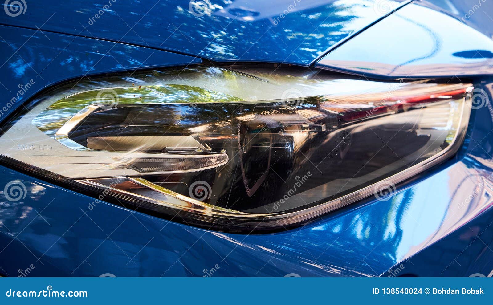 Headlights of blue car stock photo. Image of glass, closeup - 138540024
