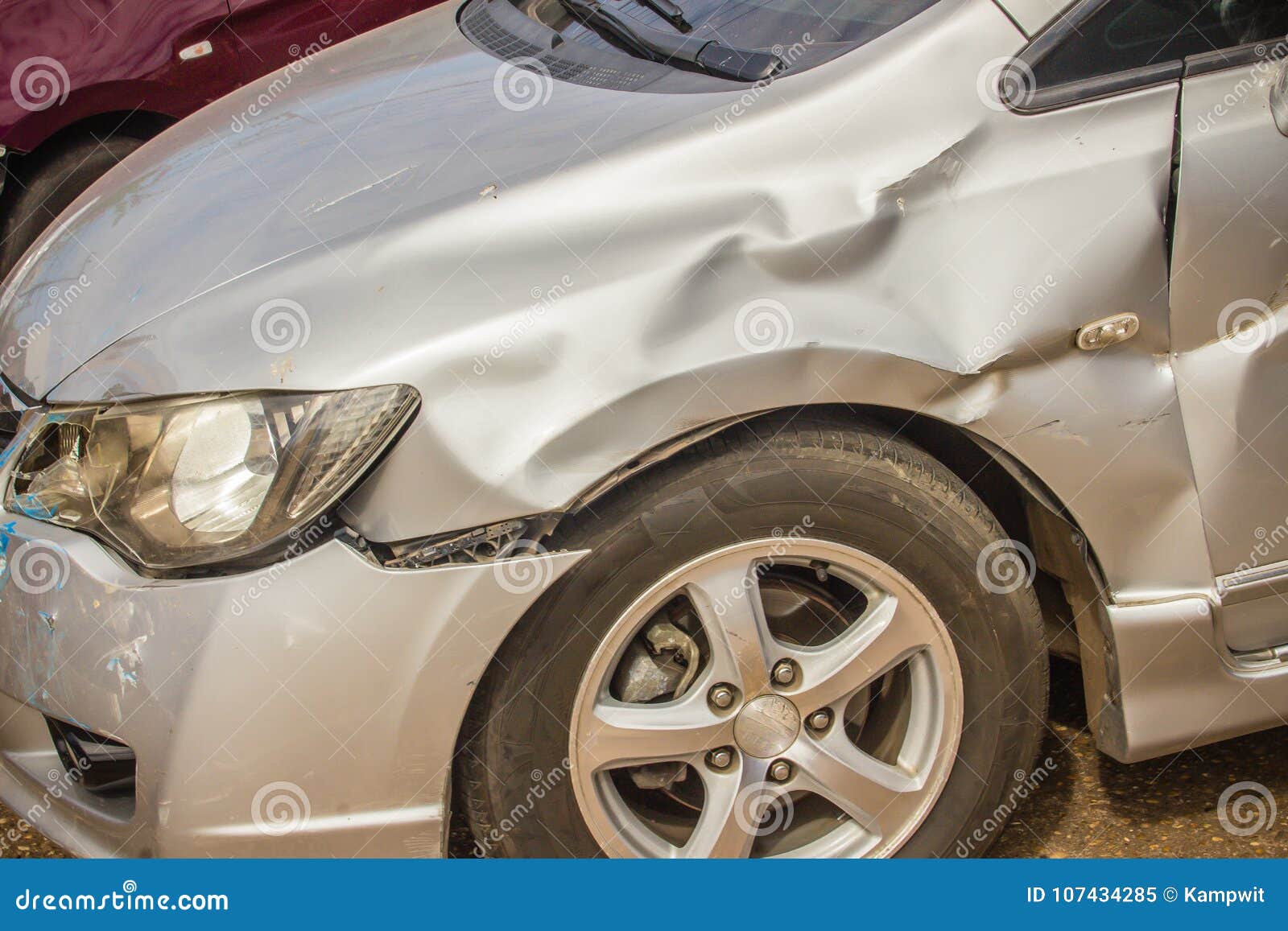 Close-up Front of New Silver Car Distorted by Accident. Crashed Stock ...