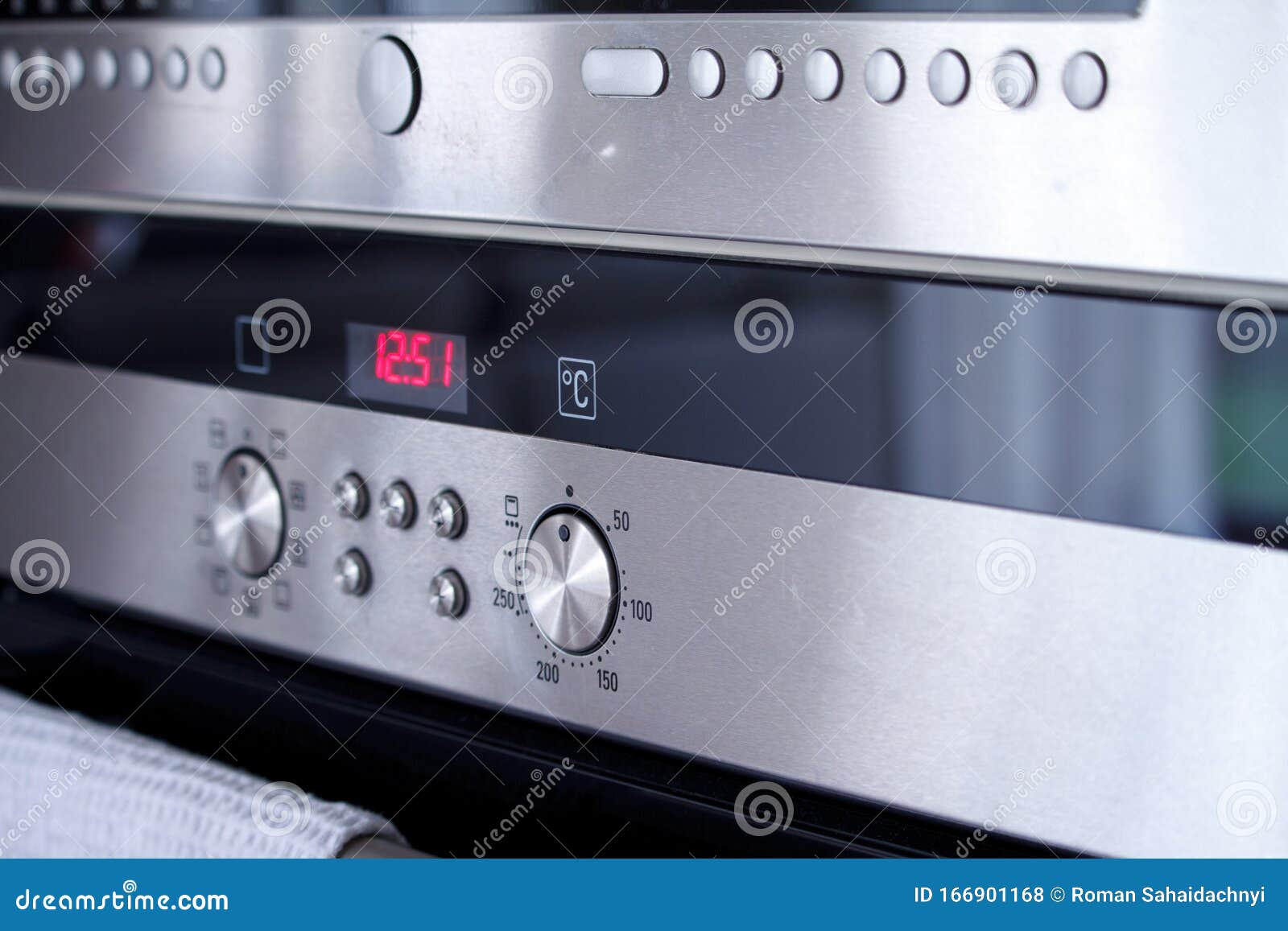 Close-up the Front Panel of the Oven with Control Poles and Switching ...