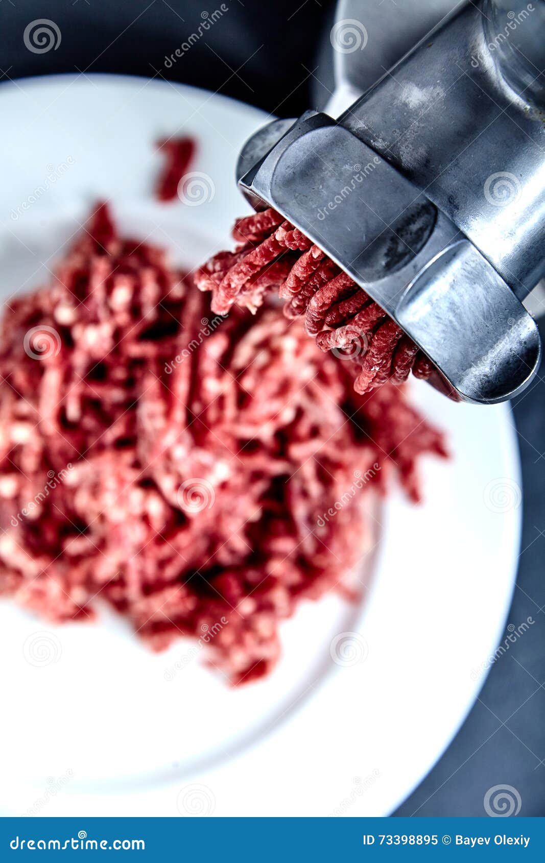 Close Up Front Part of Mincing-machine with Mincemeat in Stock Image ...