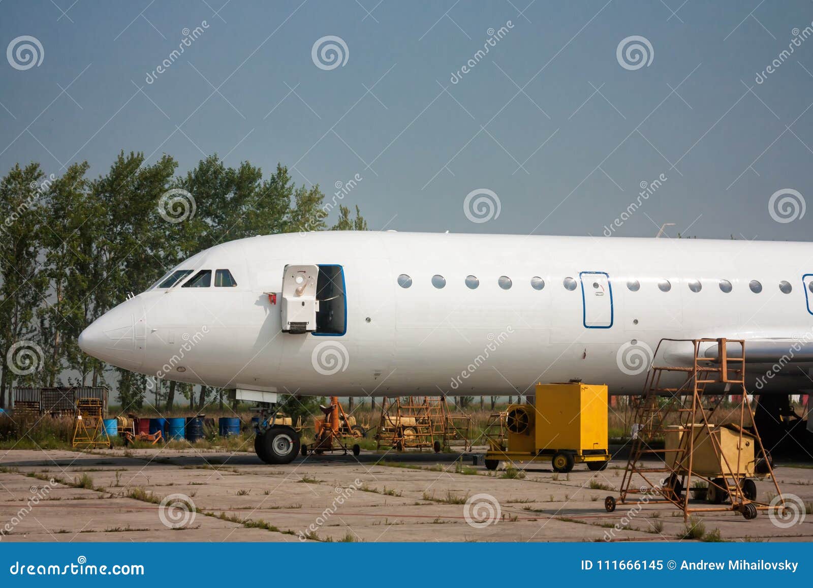 Close-up of the Front of a Passenger Aircraft with an Open Door on the ...
