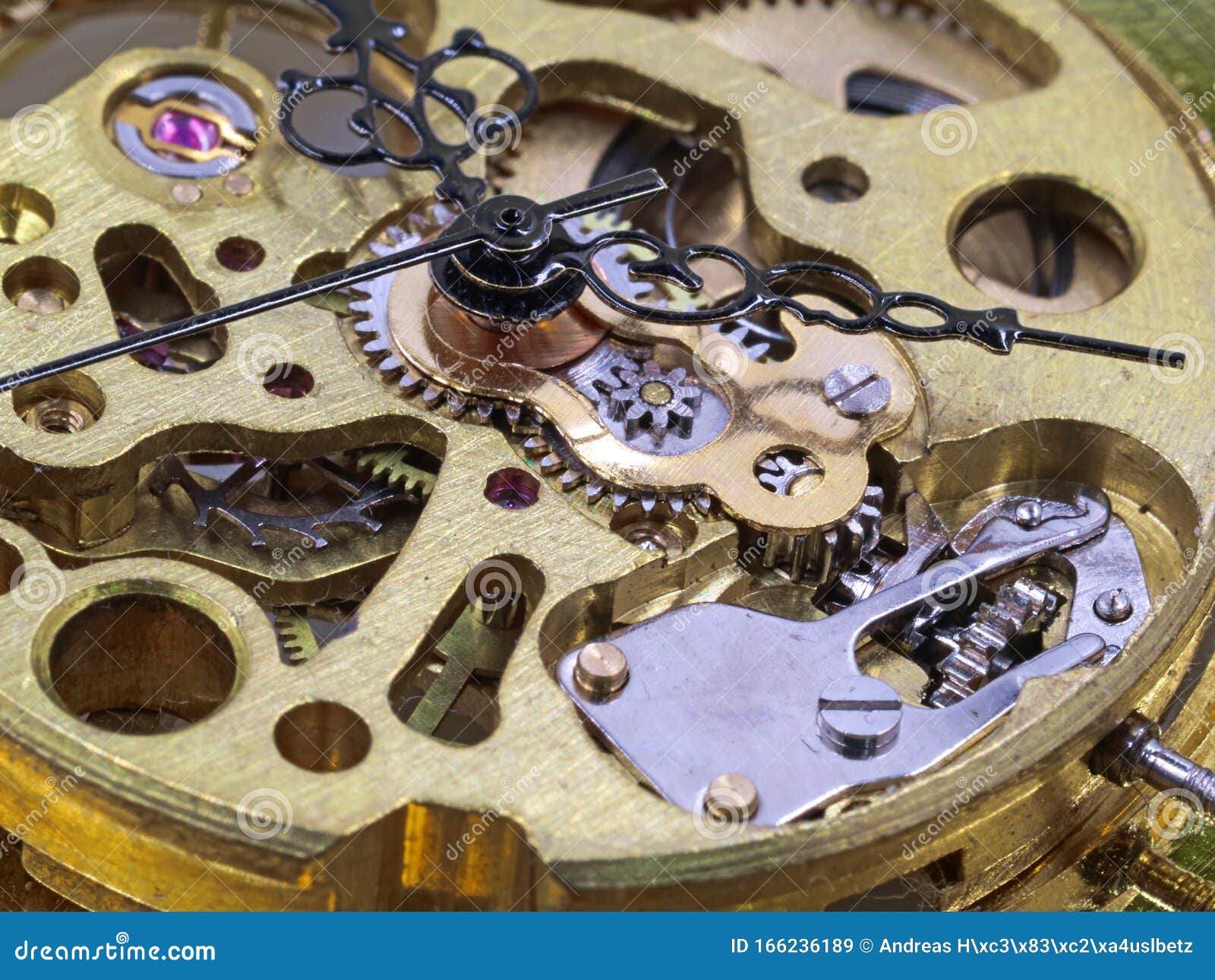 Close Up Frontside of Clockwork Mechanism of a Golden Pocket Watch ...