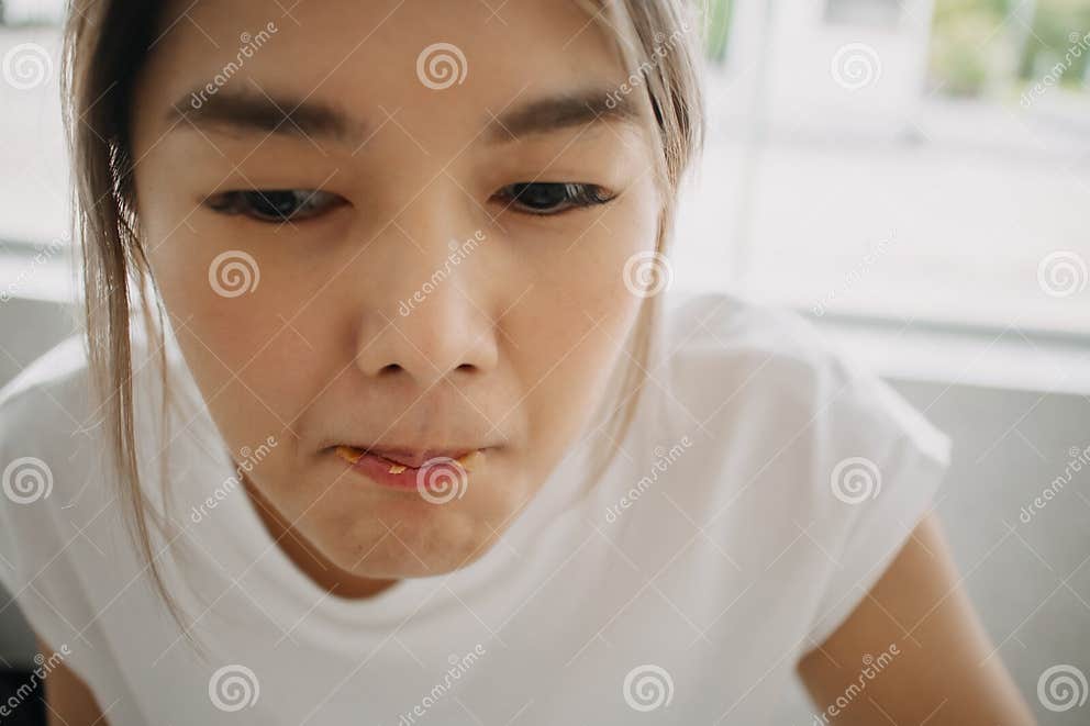 Close Up Funny Face Of Woman Eating Cake In The Cafe Stock Image